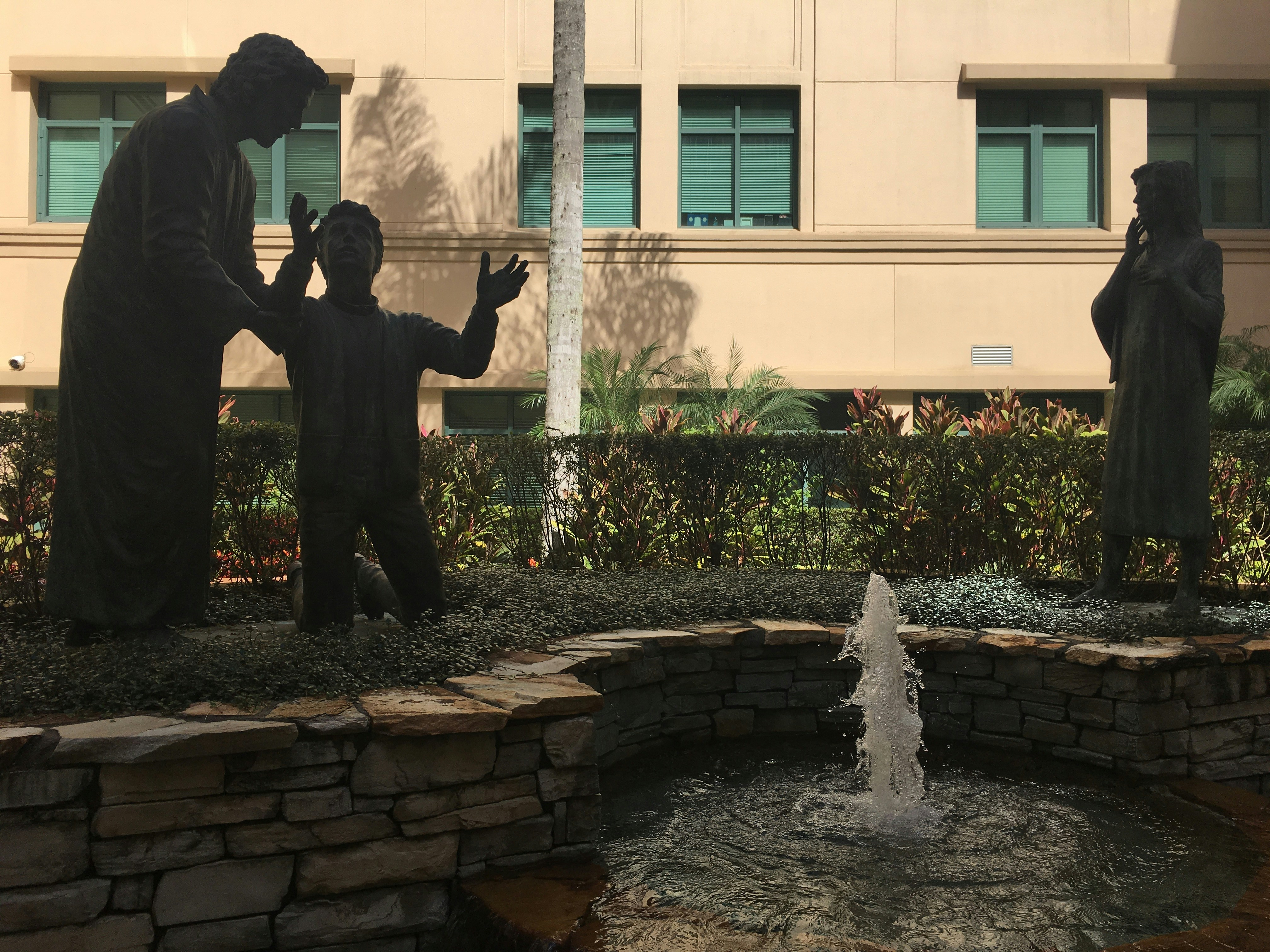 Hands Afloat: A Quiet Moment by the Fountain