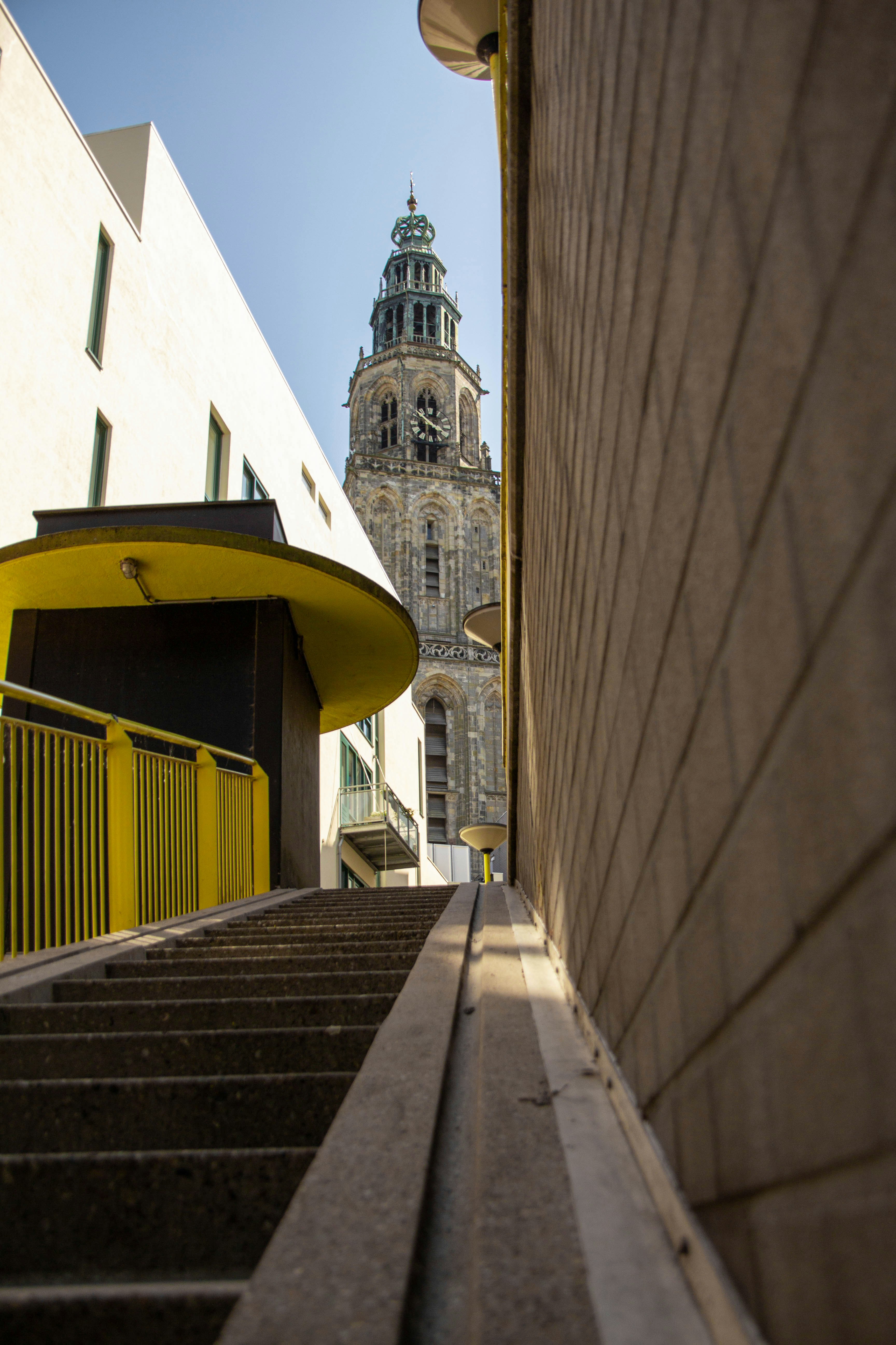 Stairway toward the Clock Tower: Juxtaposition of Modern Lines and Historic Spires