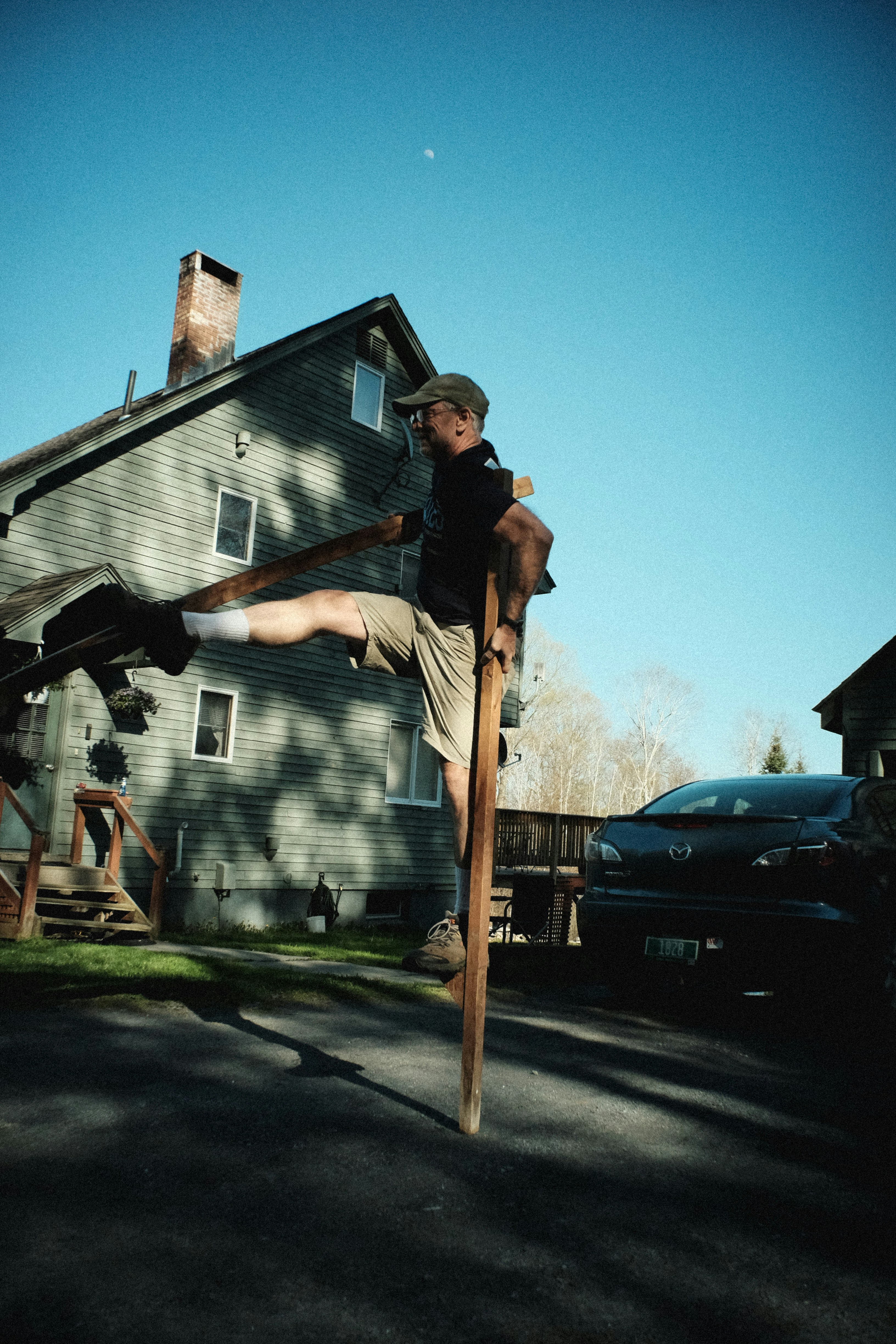 Balancing on the Post: A Surprising Home Gym Moment Outdoors