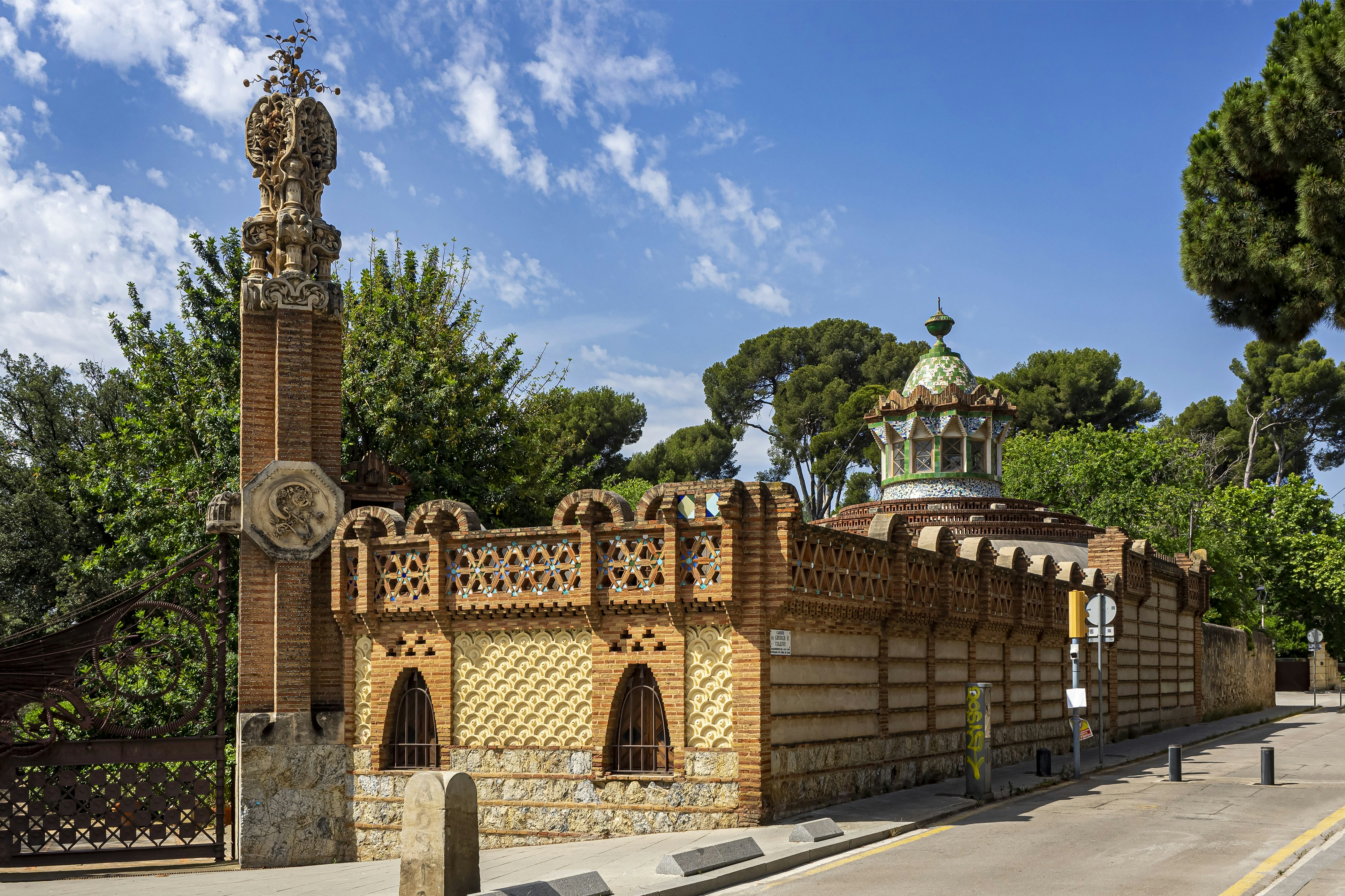 Lattice Gatehouse with Turreted Pavilion Under a Blue Sky