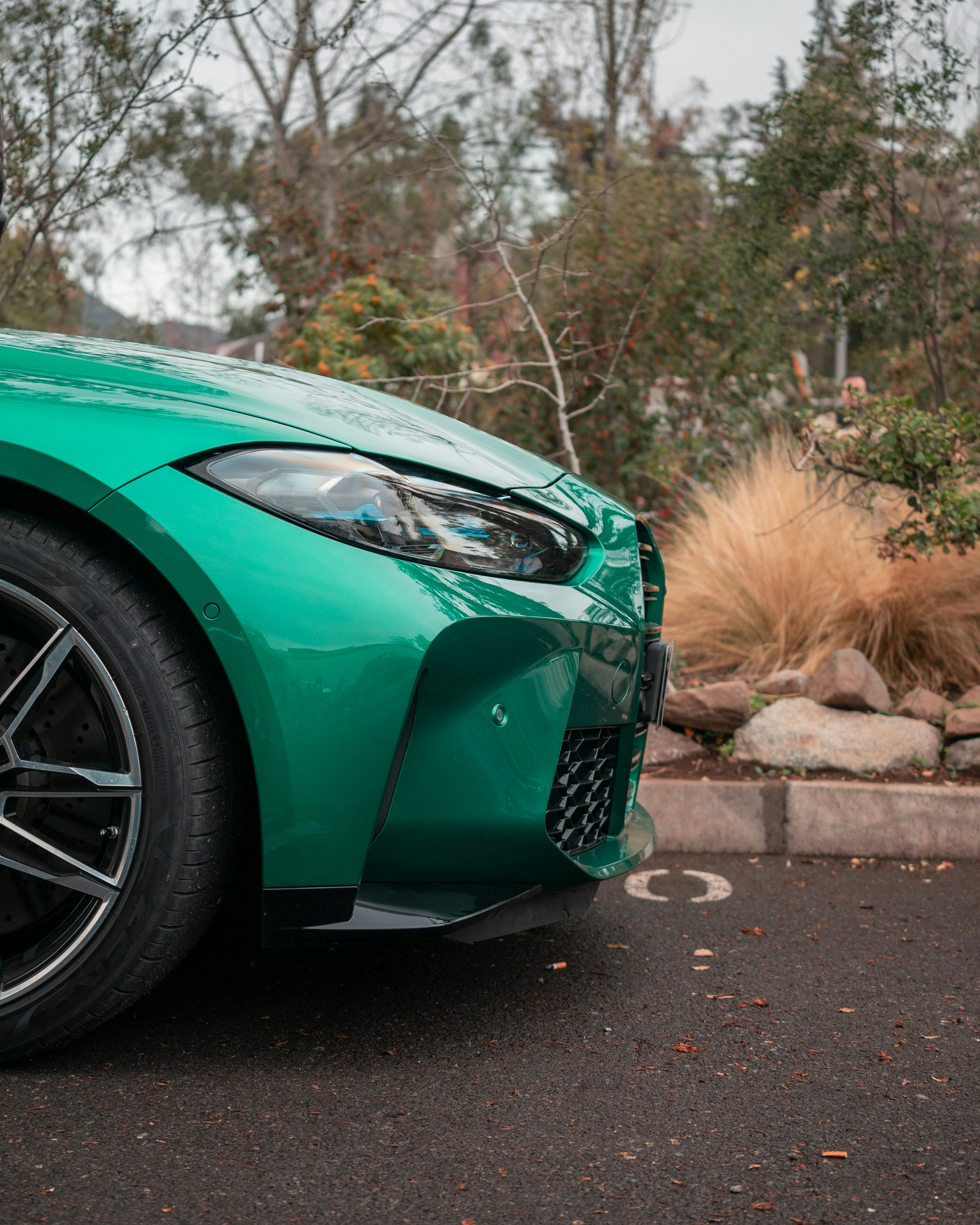 Emerald Front End: A Close-Up of a Lime-Green Sports Coupe's Fierce Nose