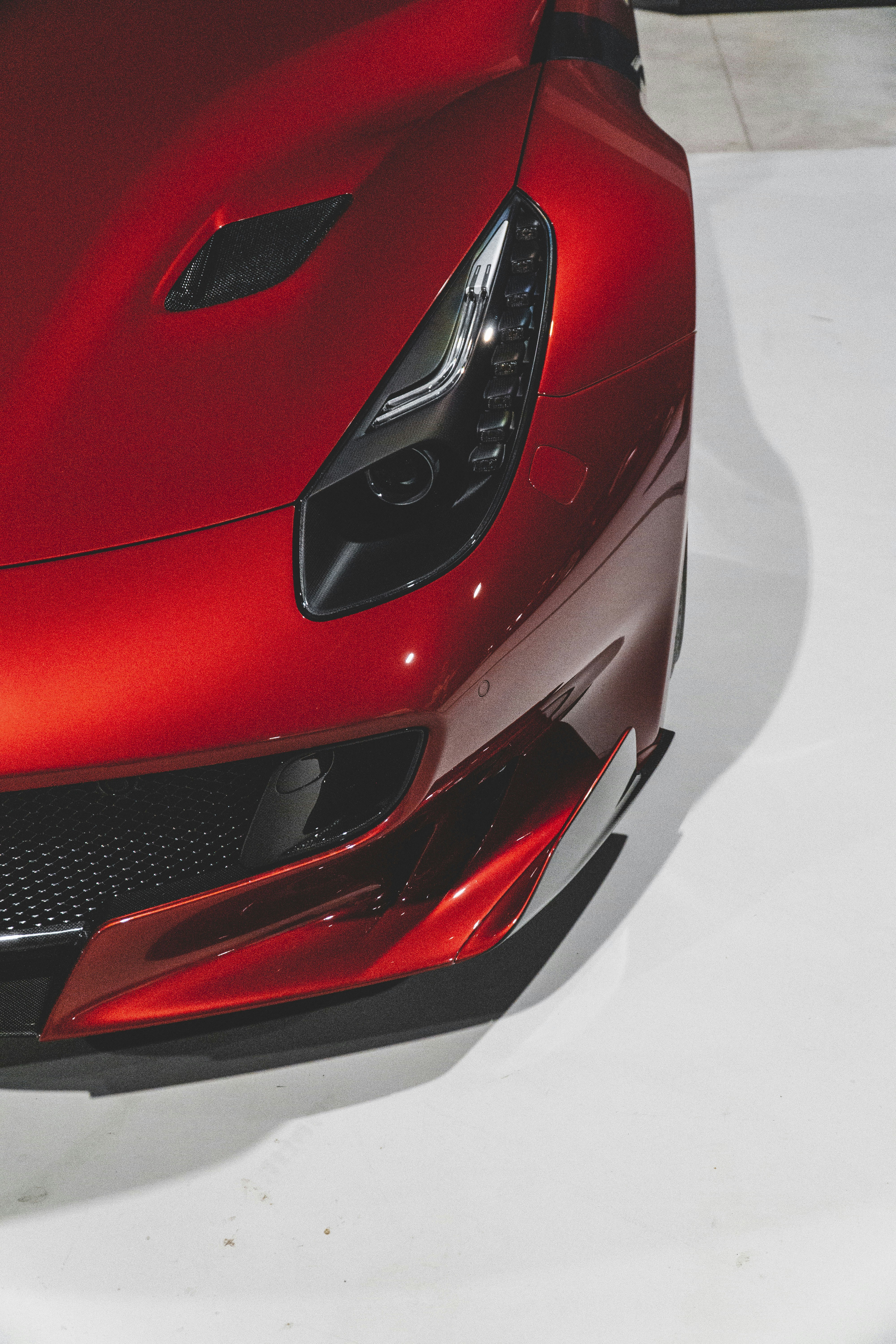The front end of a red sports car photo – Free Ferrari f12 tdf Image on ...