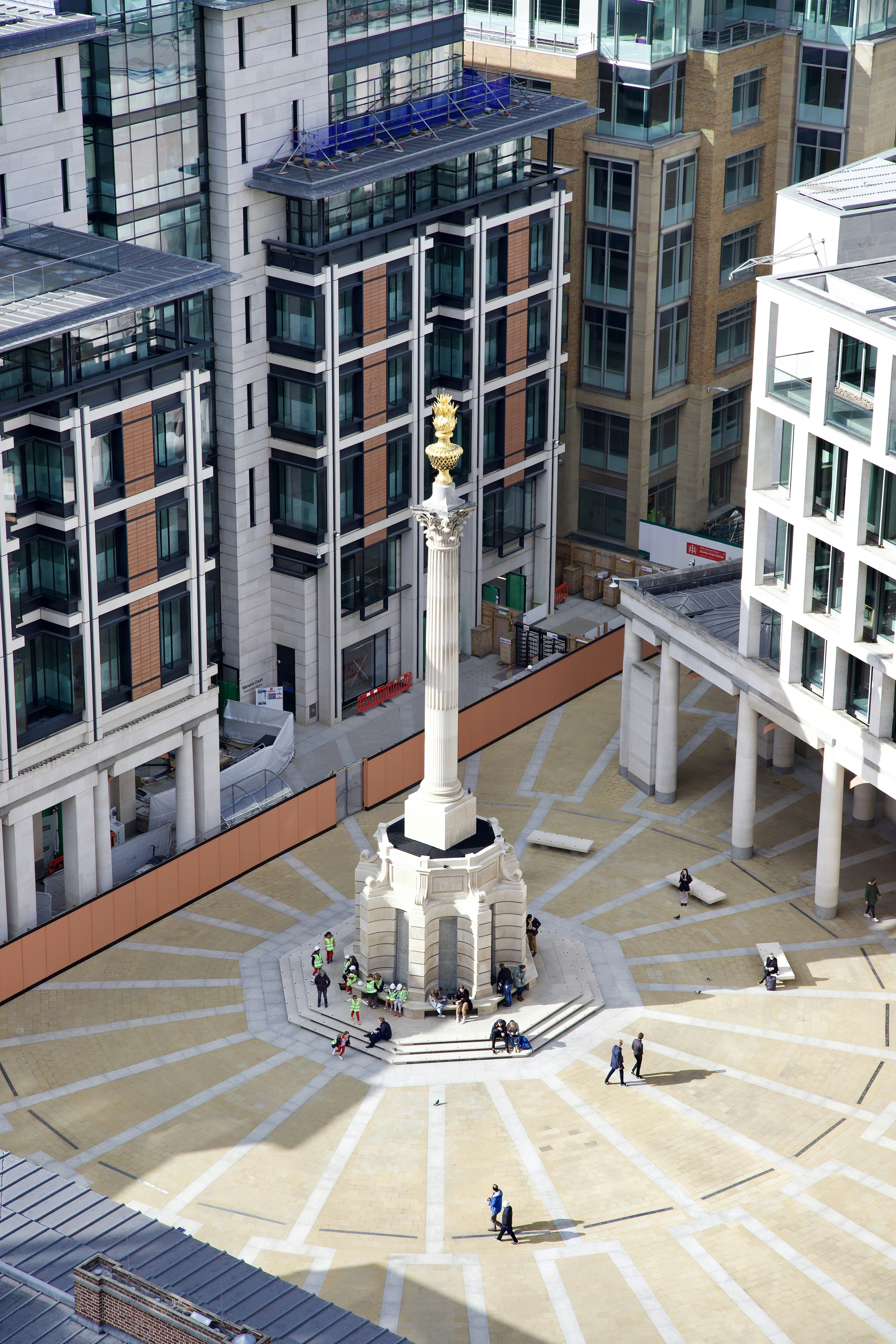 Central Obelisk Plaza: Aerial View of the Monument in a Modern Courtyard