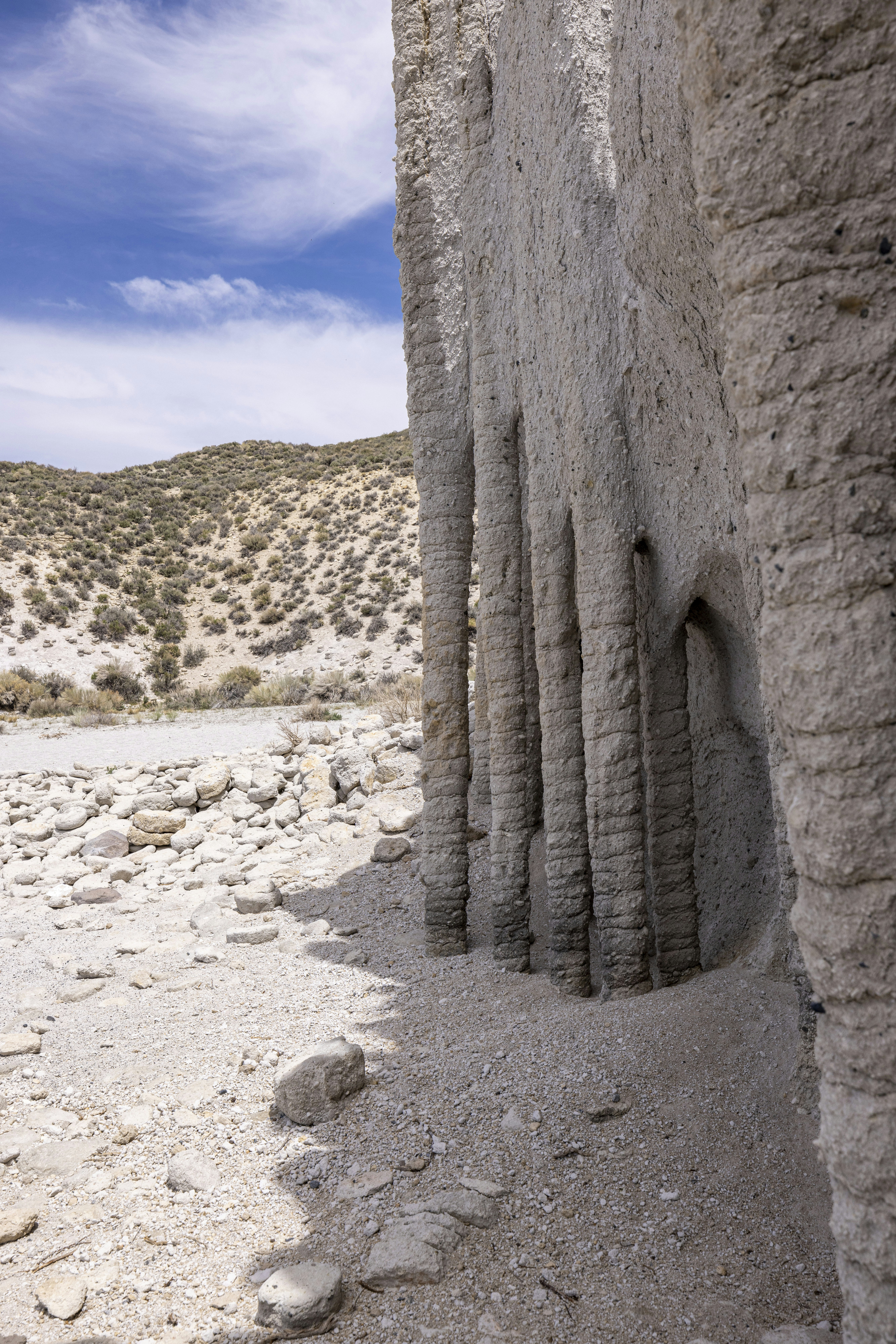 Desert Cathedral: Eroded Columns Framing a Quiet Basin