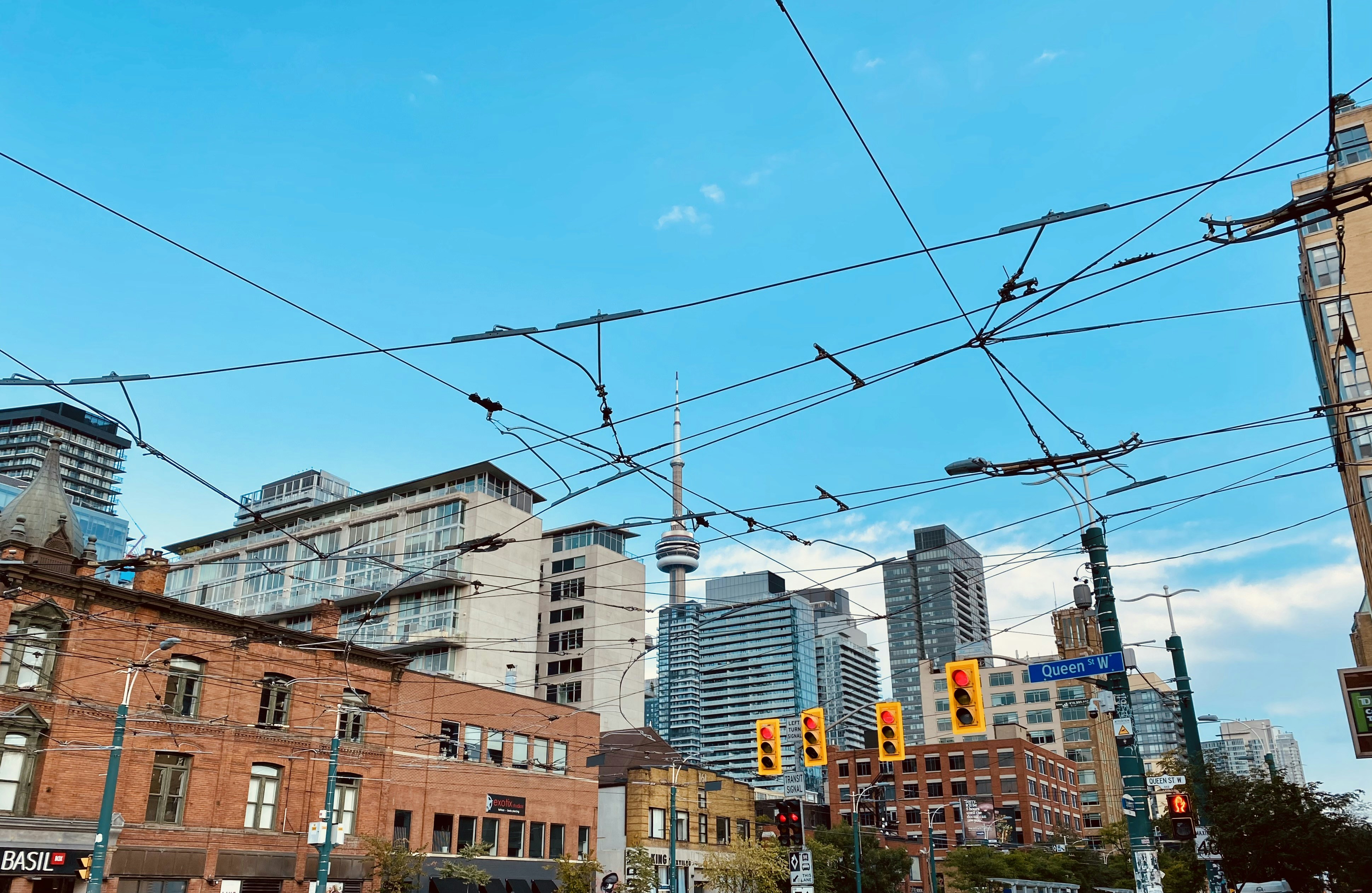 Overhead Wires and Glass Towers: A Noon Study in Urban Angles