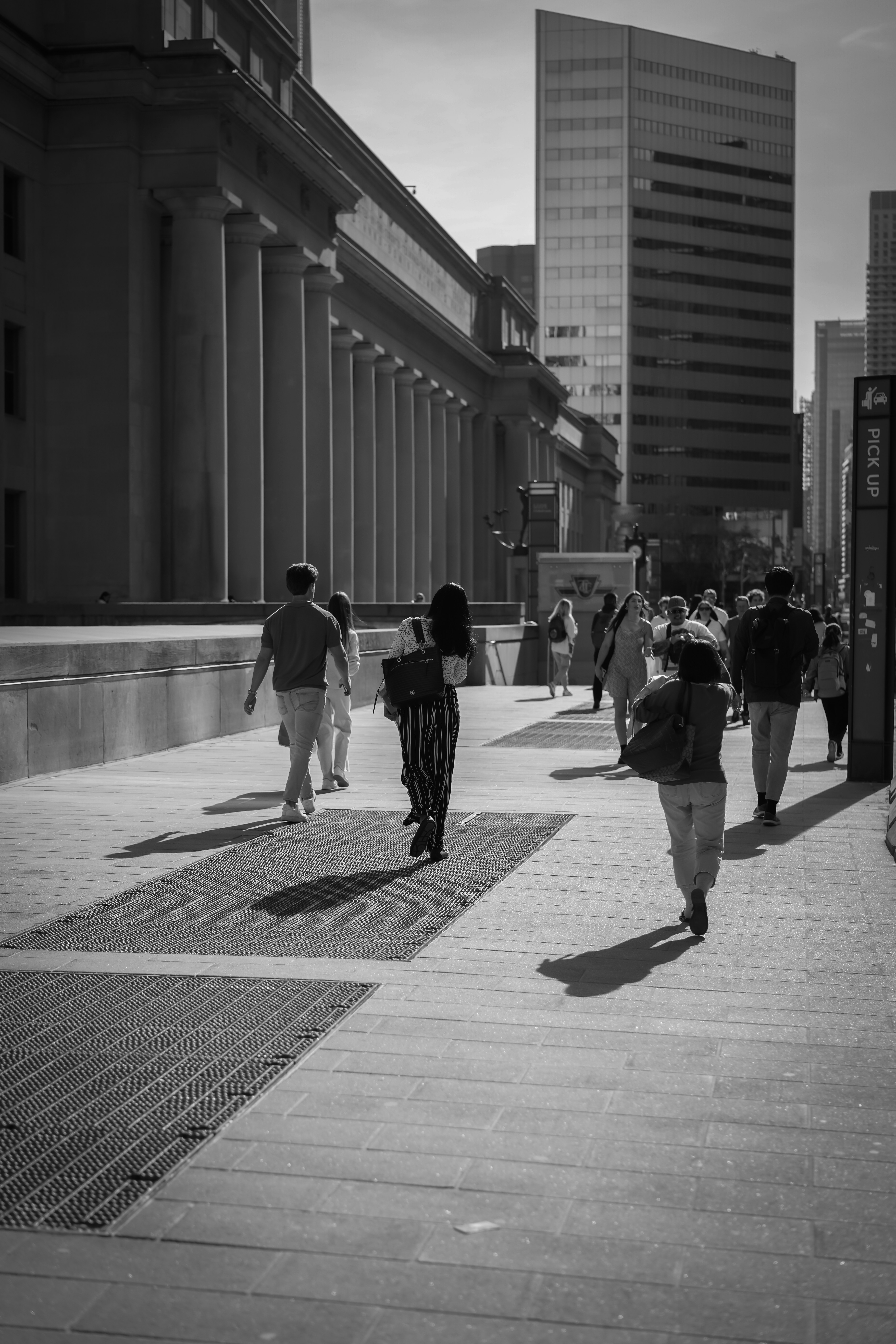 Stride Along the Colonnade: Stripes, Shadows, and Towering Glass