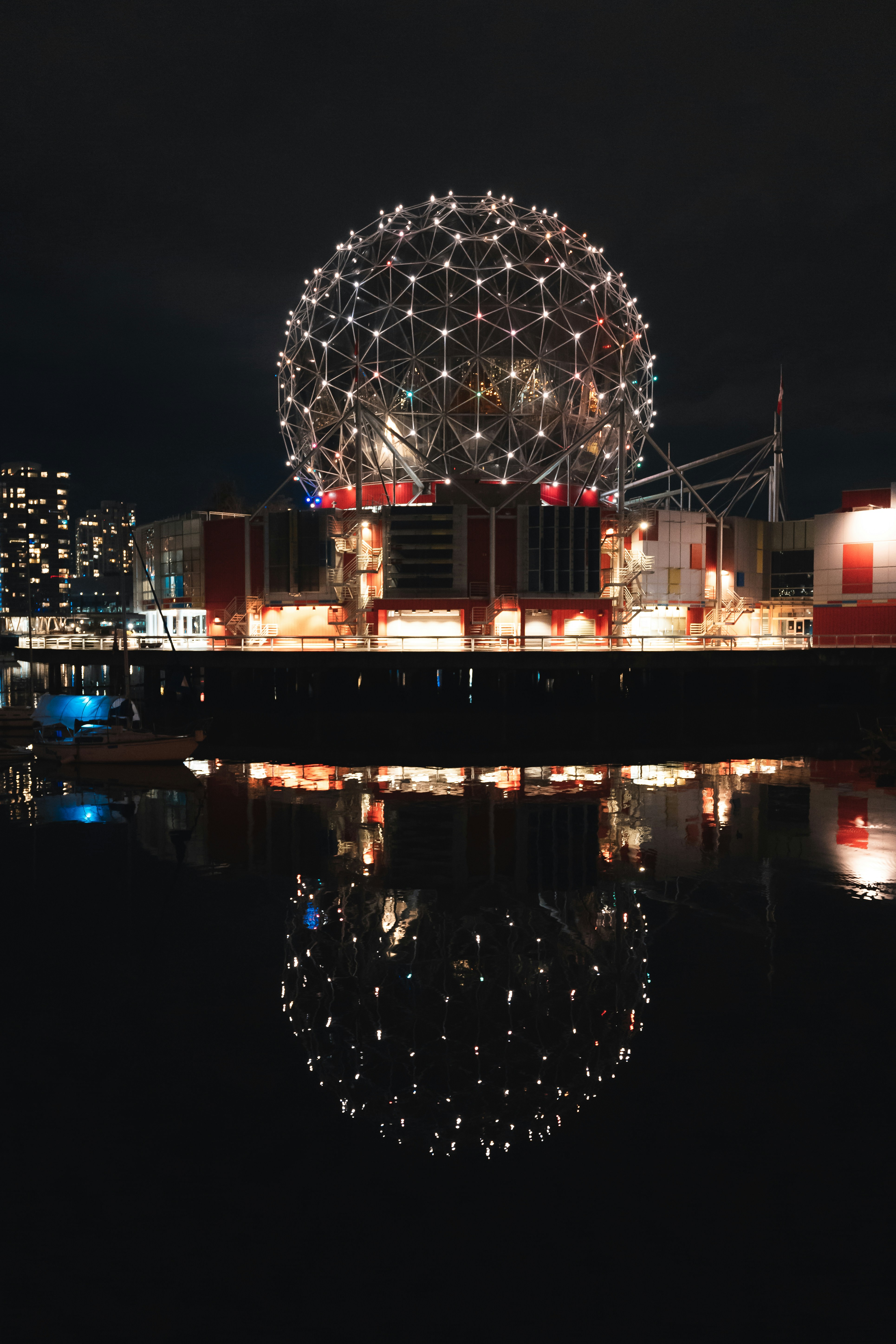 Midnight Geodesic Sphere: Neon Crown Over the Waterfront