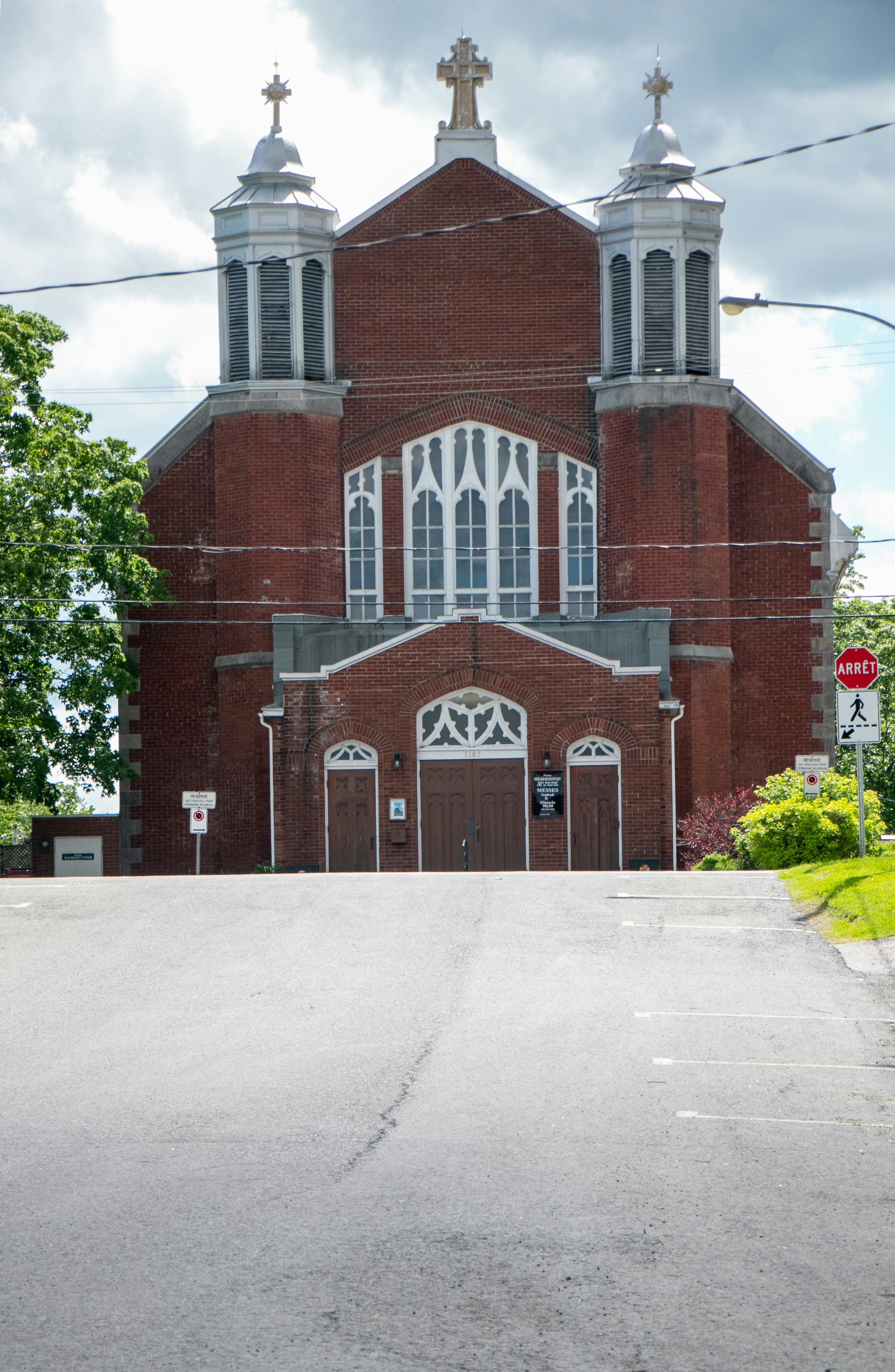 A large red brick church with two towers photo – Free Sainte-adèle ...