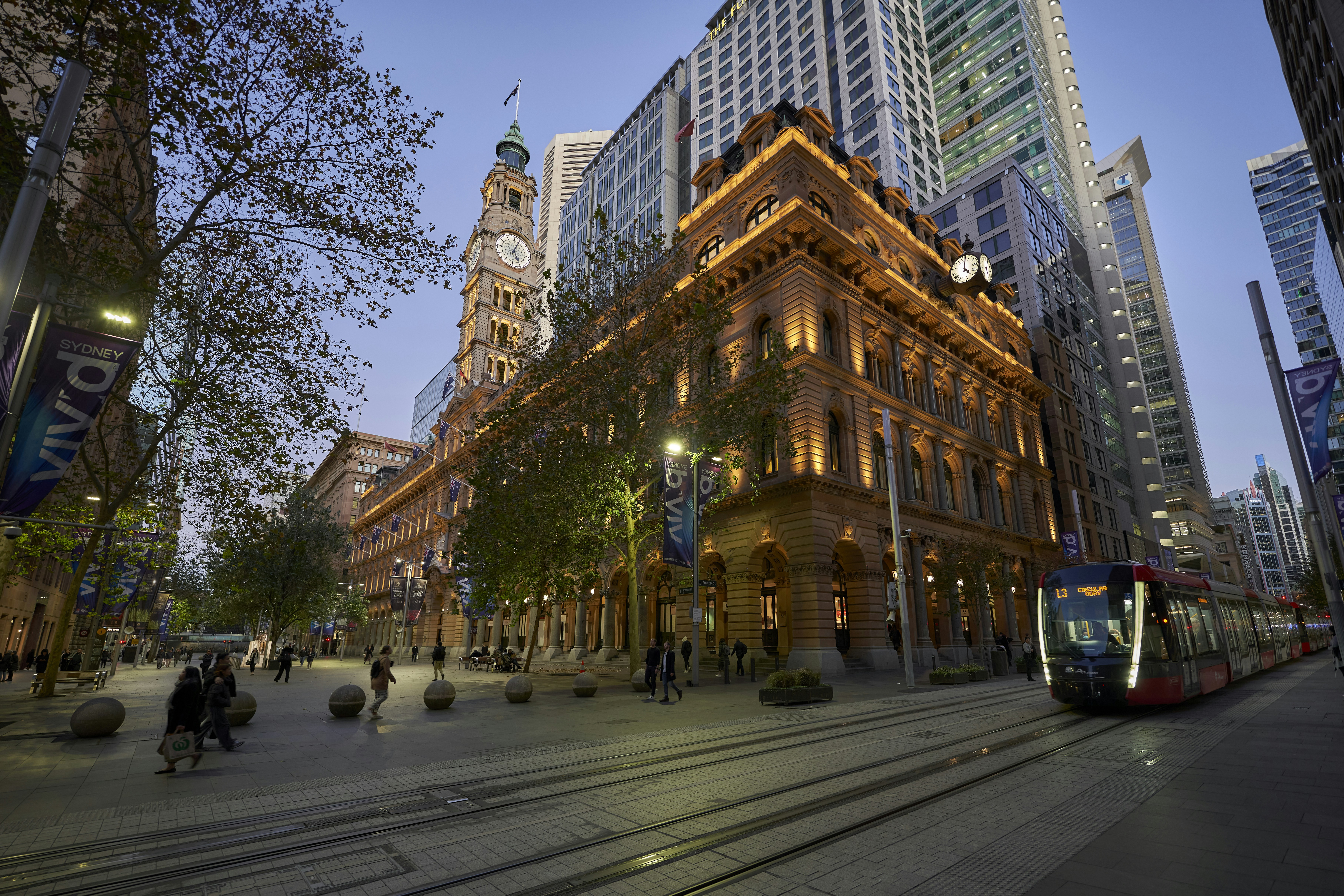 A street scene with a trolley and a building photo – Free Cbd Image on ...