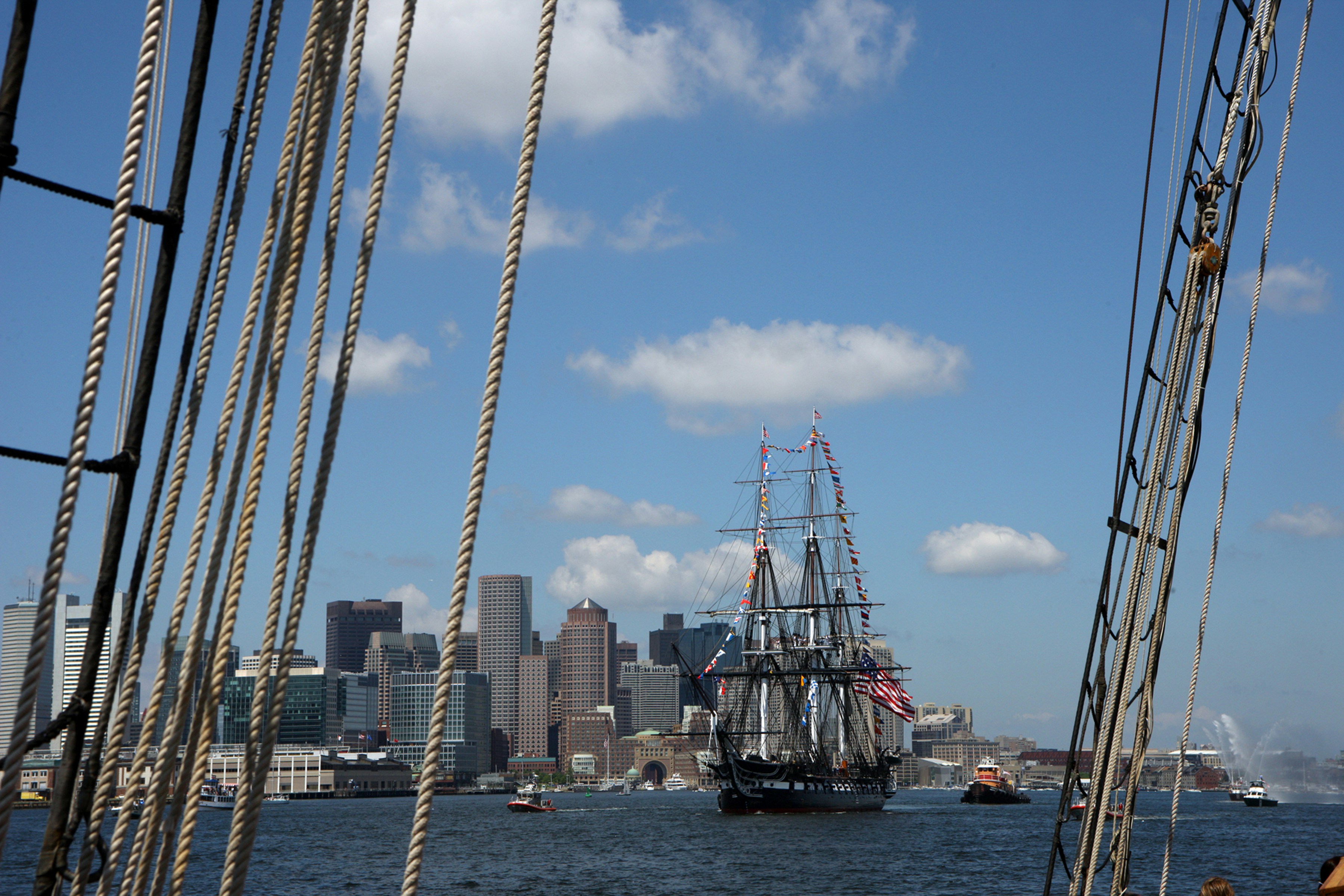 Harbor Confluence: A Tall Ship Against a Modern Skyline