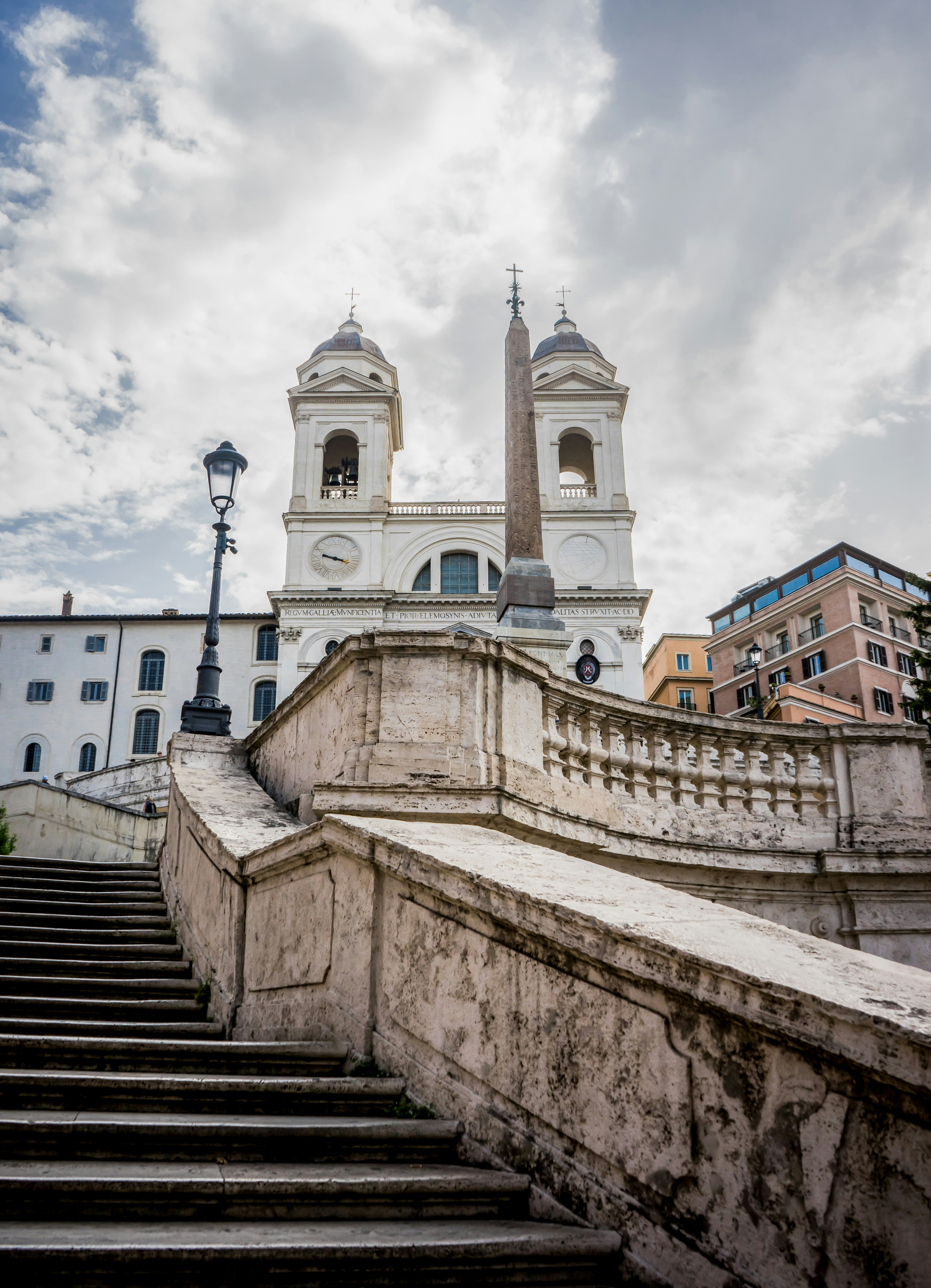 A very tall building with two towers on top of it photo – Free Rome ...