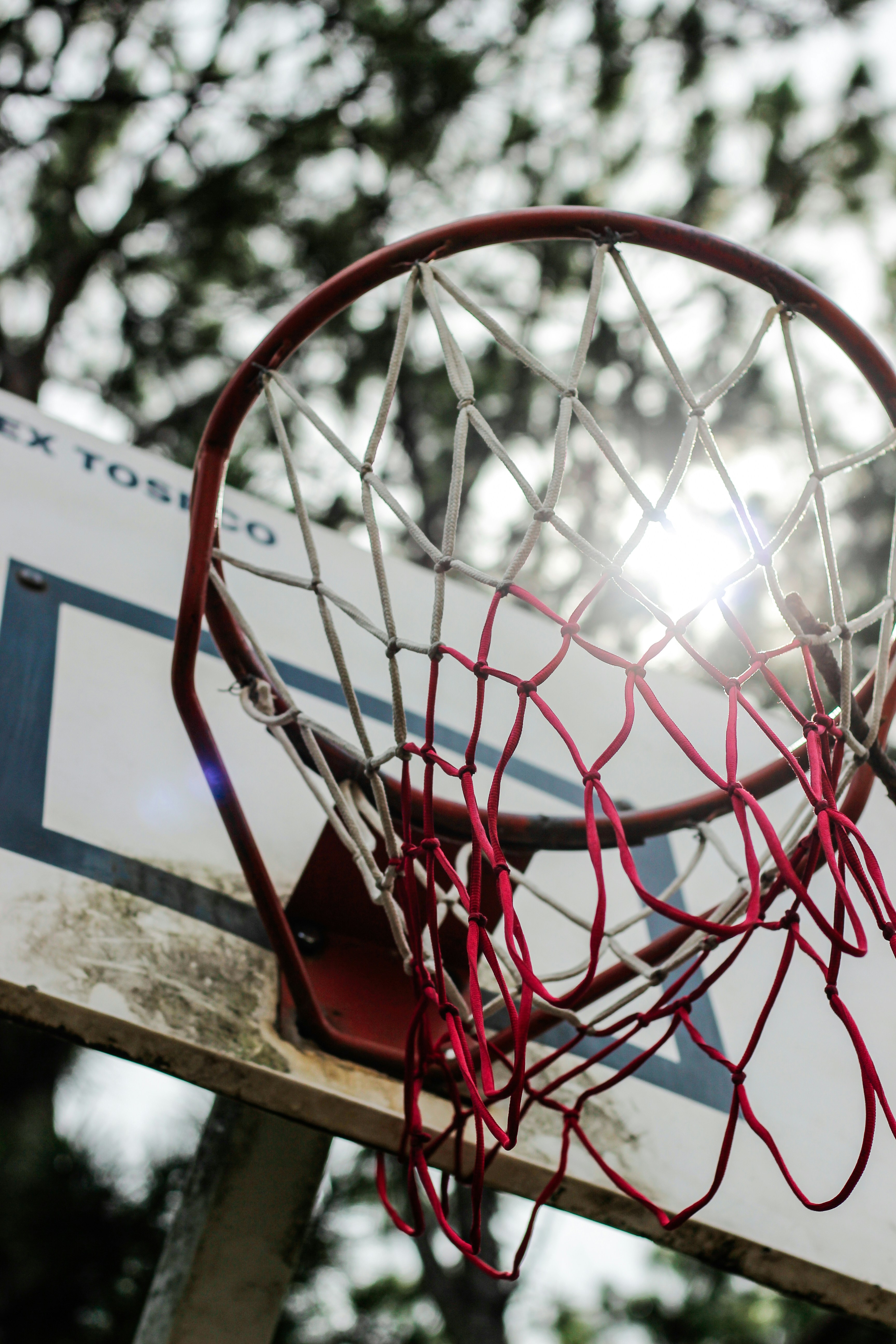A close up of a basketball going through the net photo – Free Dalat ...