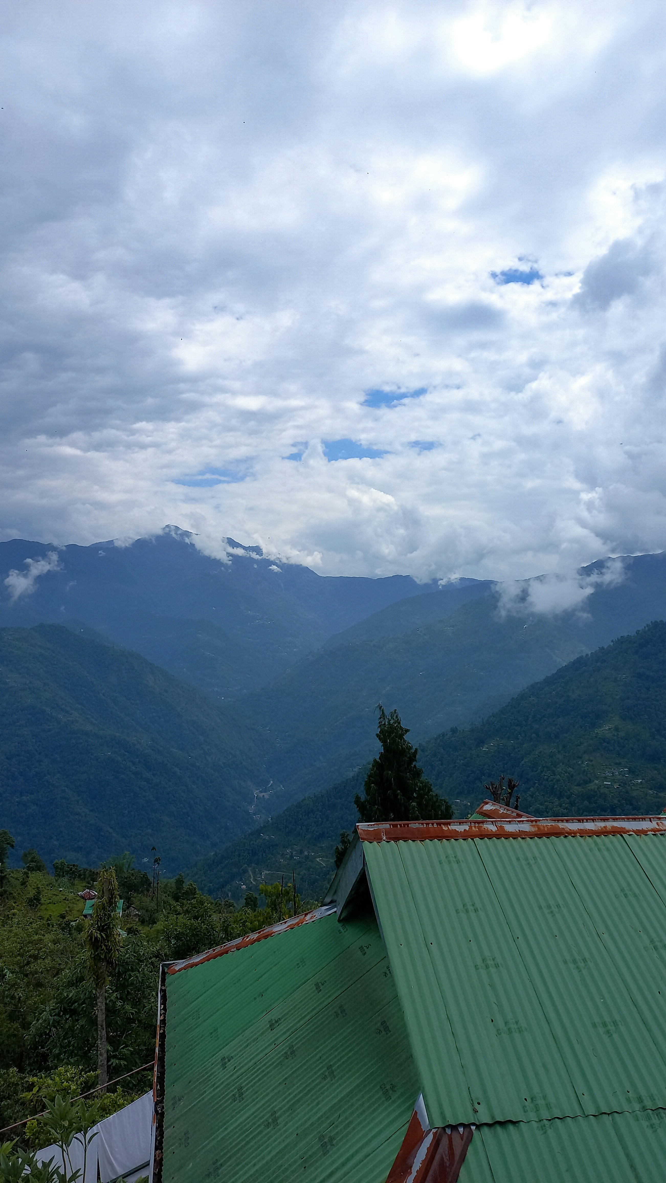 A view of mountains from a roof of a building photo – Free Mankhim top ...