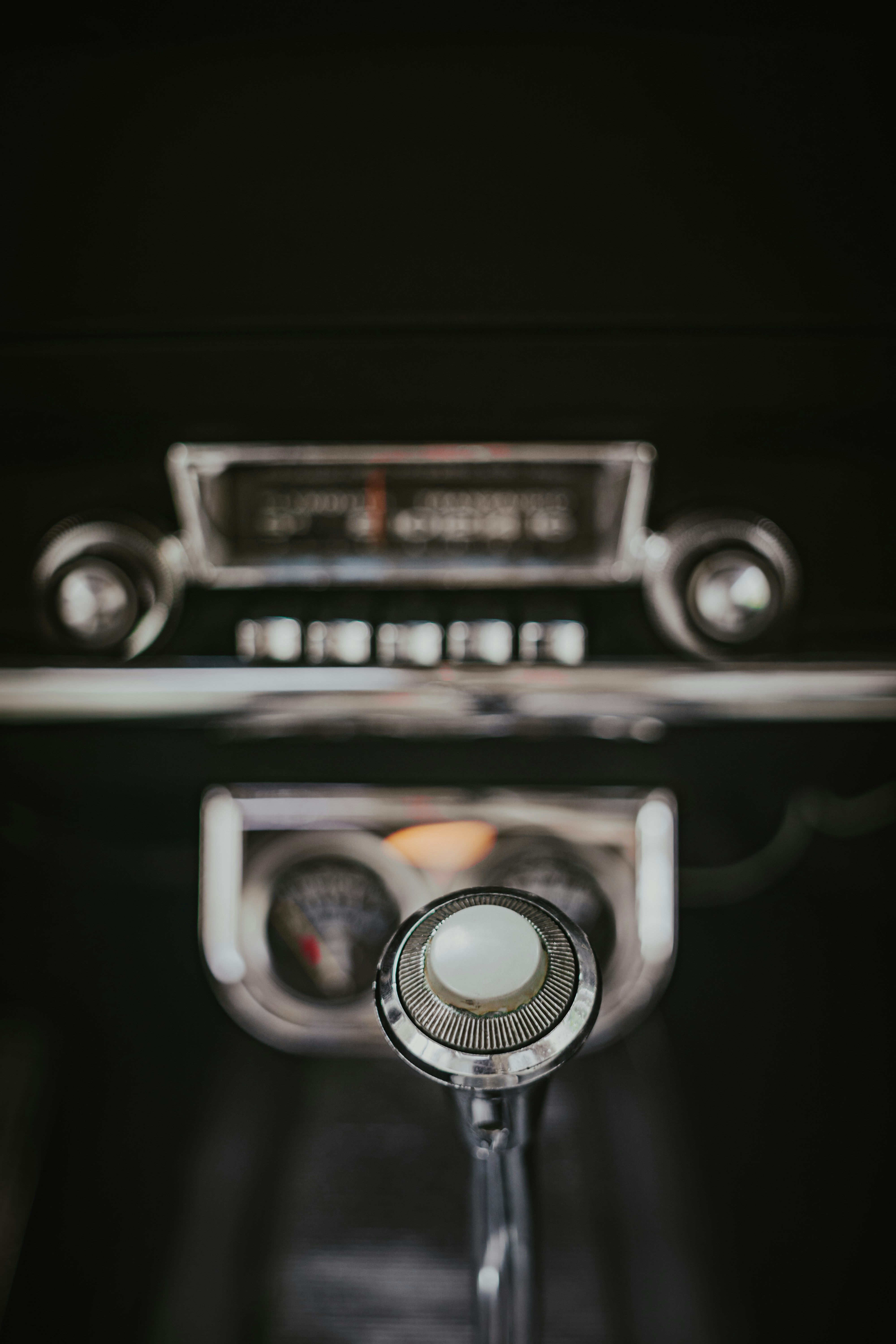 a close up of a car dashboard with a radio