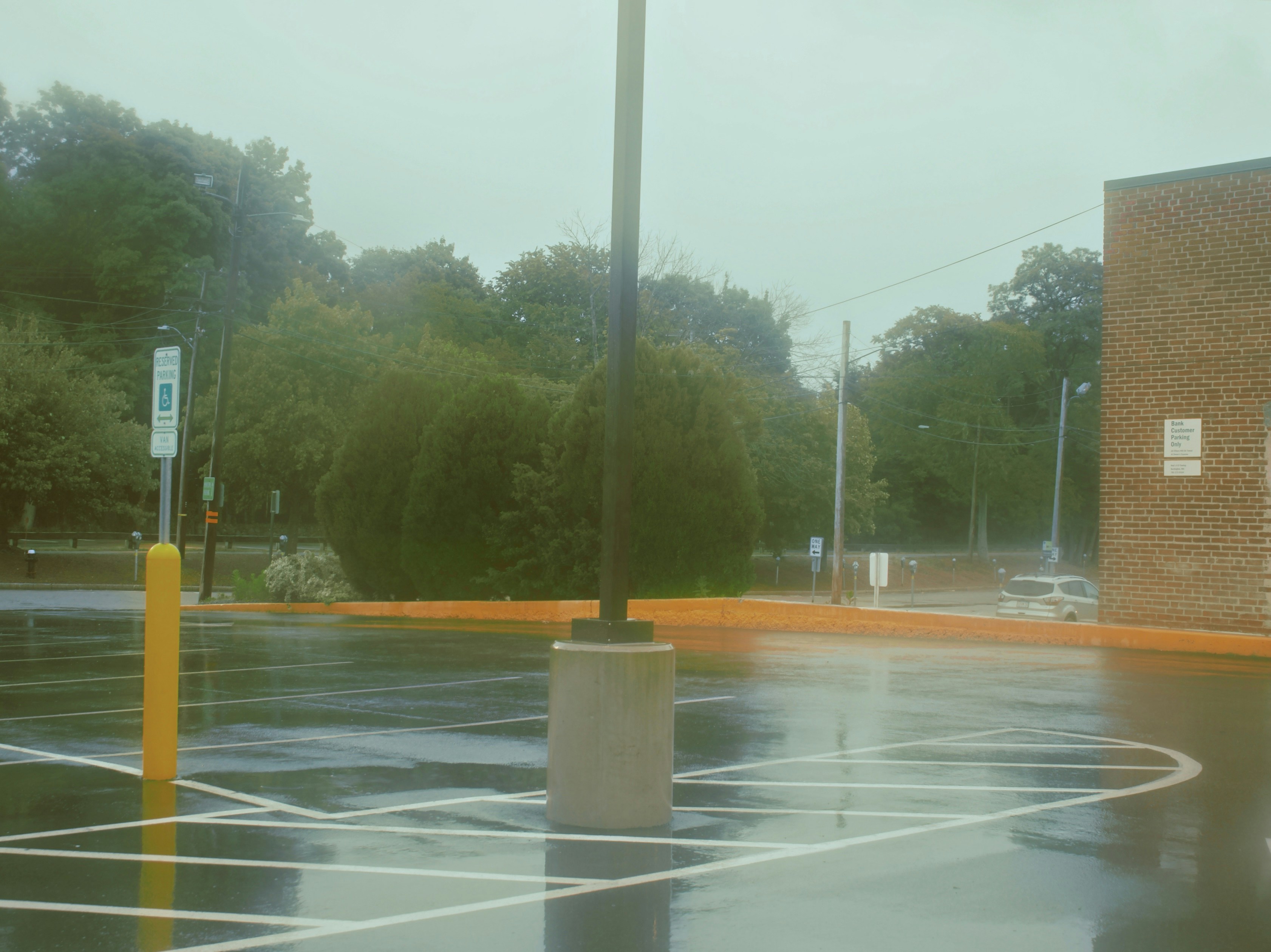 Soft Neon Dawn Over a Quiet Parking Lot