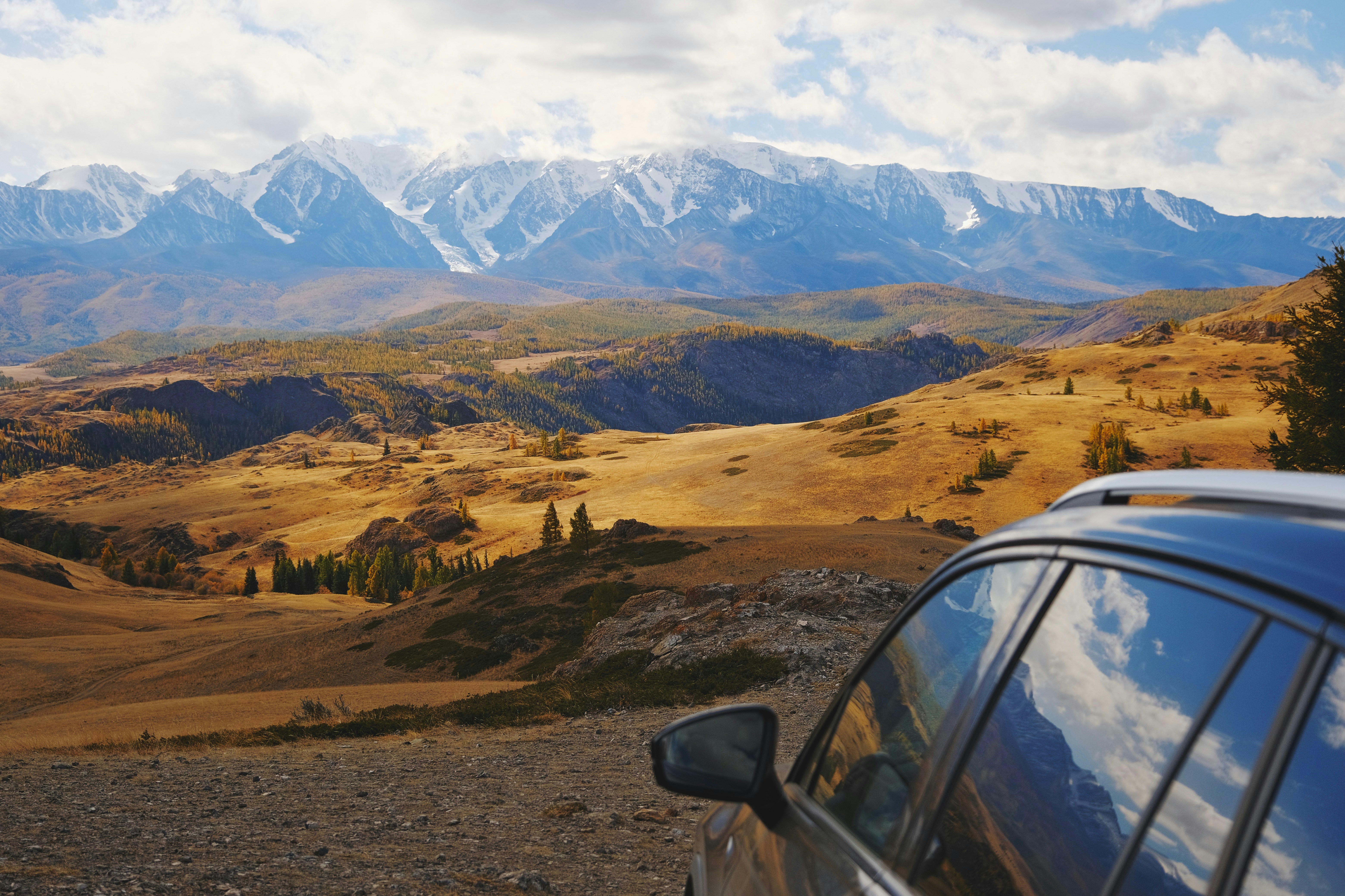a car is parked on the side of the road