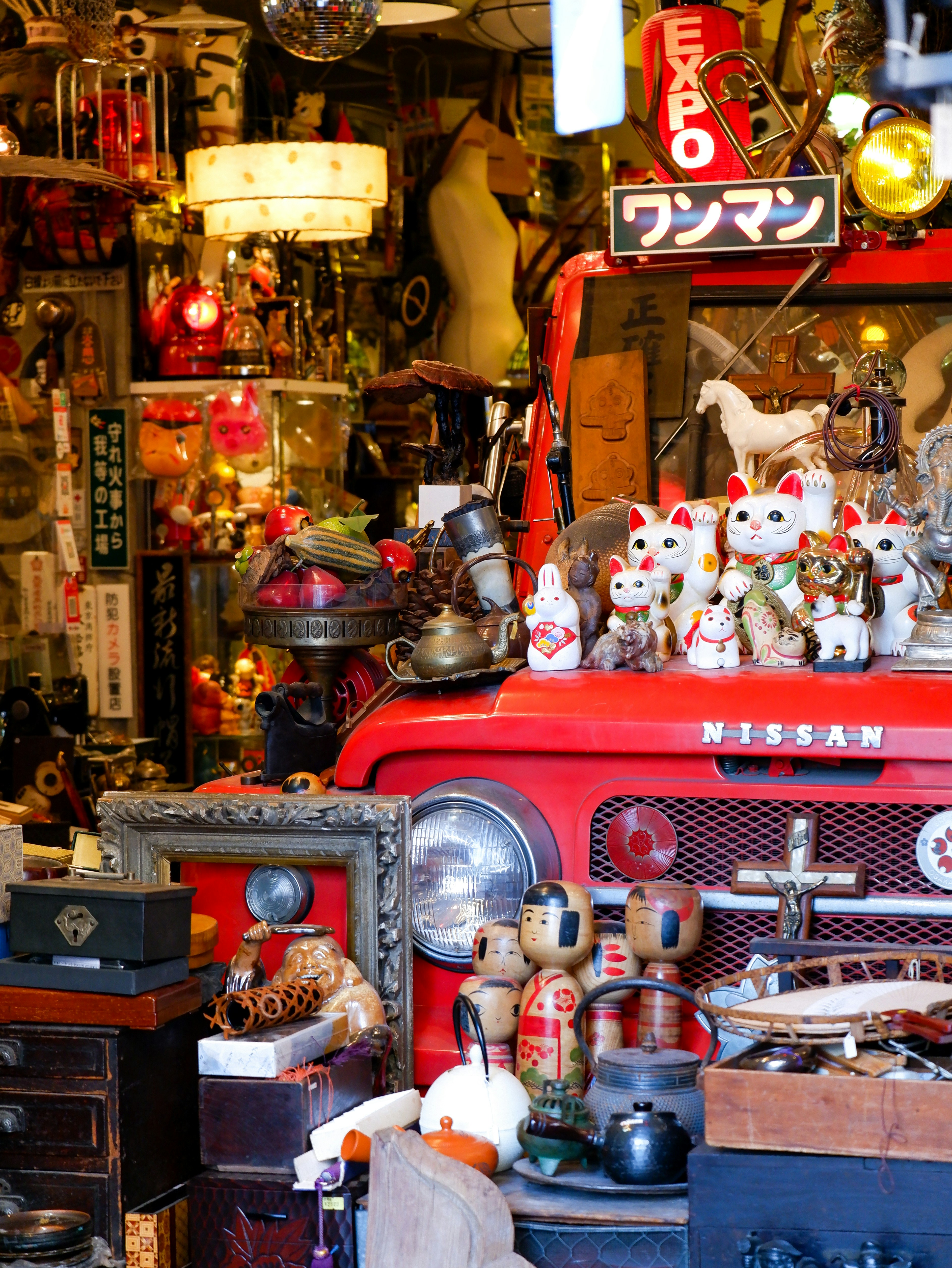 A red truck with lots of stuff on top of it photo – Free Second hand ...