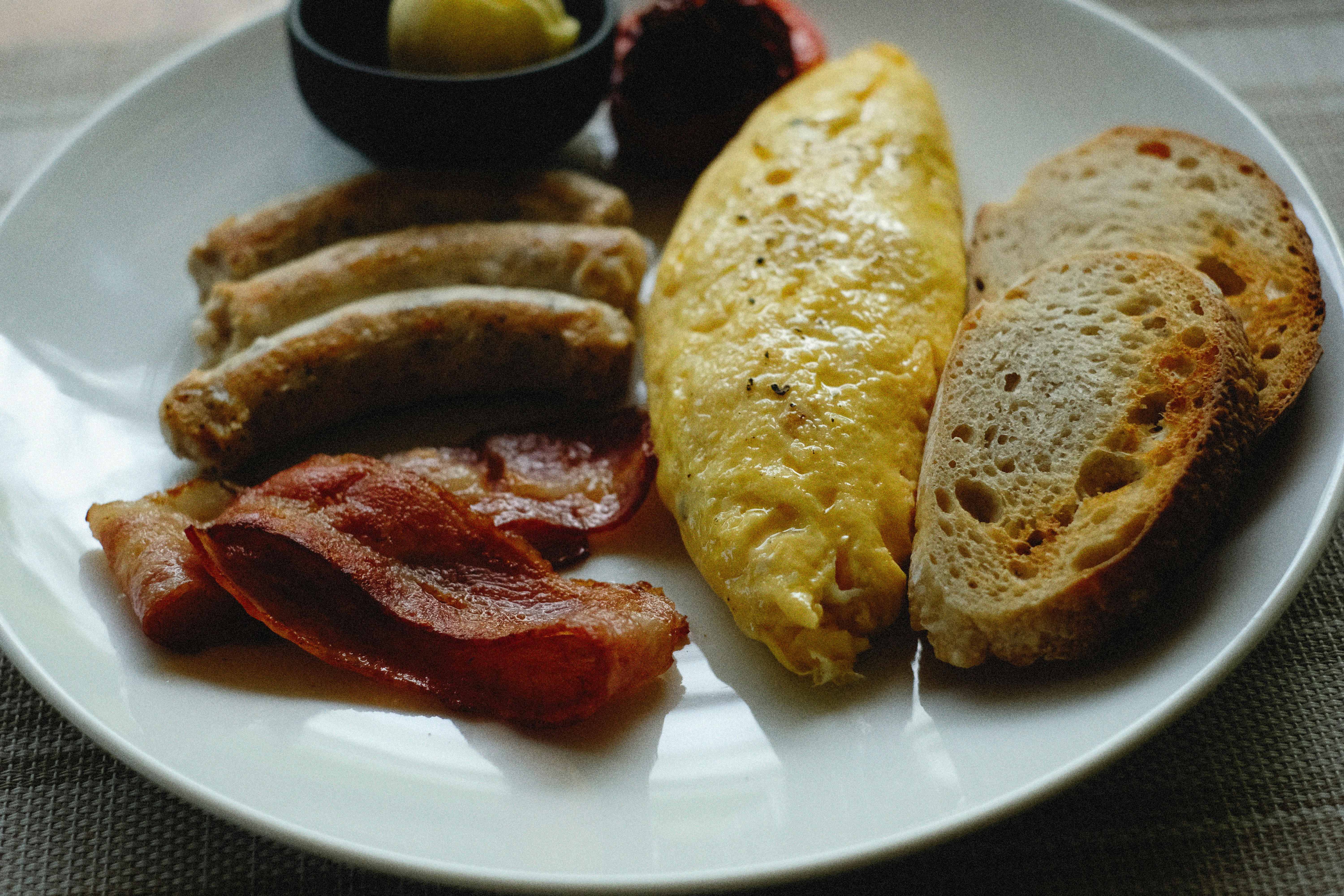 Golden Omelette Anchors a Rustic Breakfast Plate