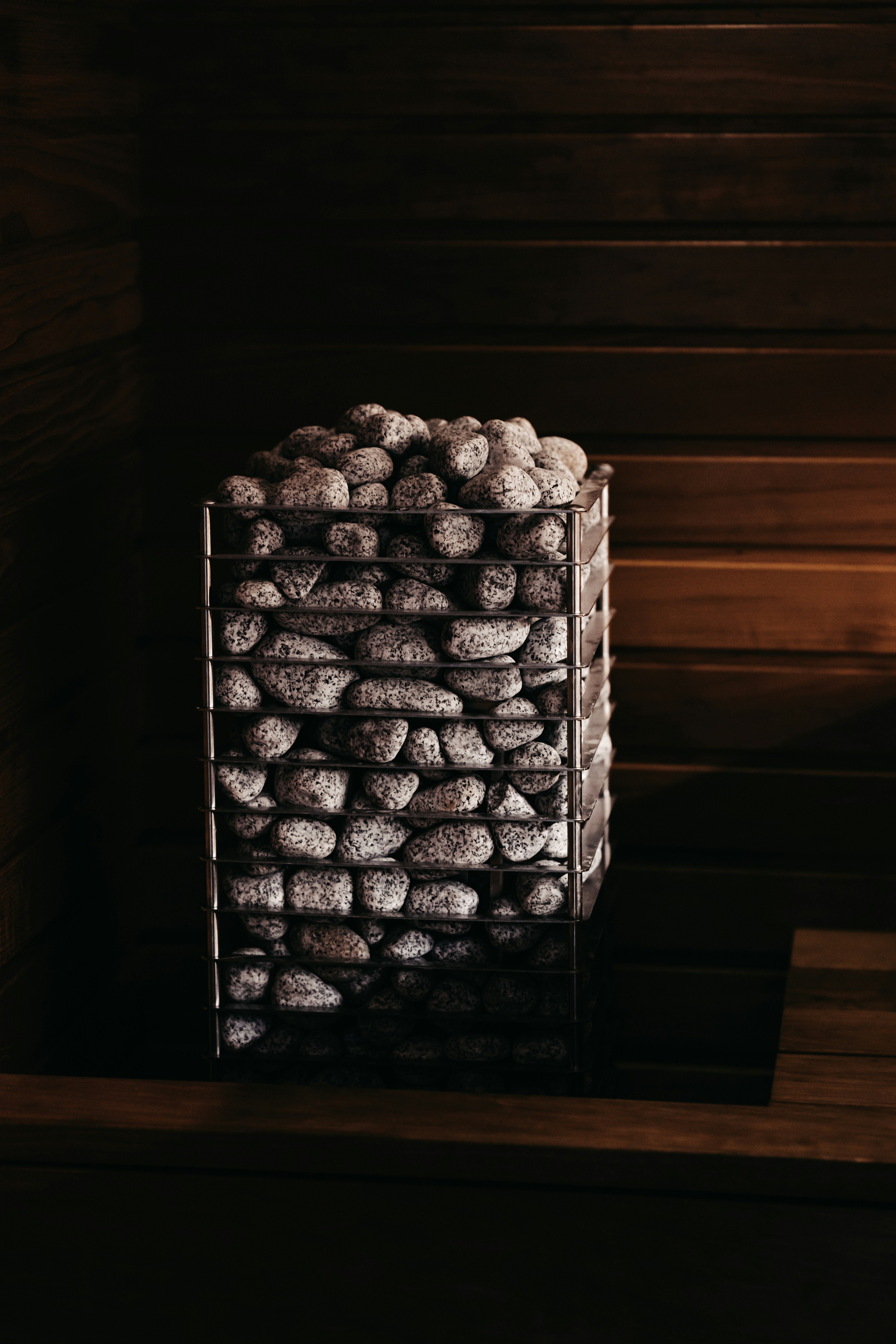 A stack of rocks sitting on top of a wooden table photo – Free Wellness ...