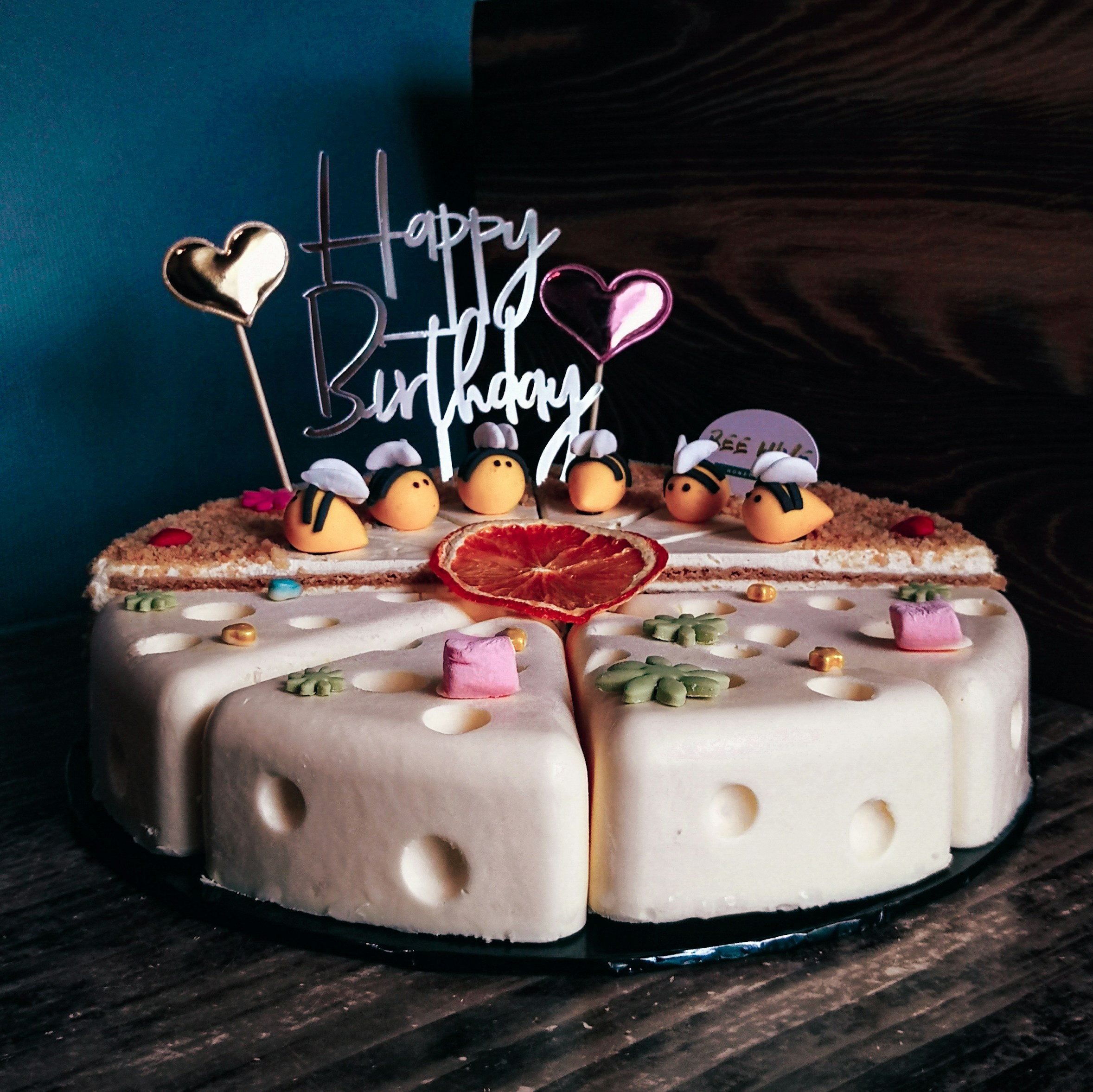 Bees on a Birthday Cake: Delicate Details Under Soft Light