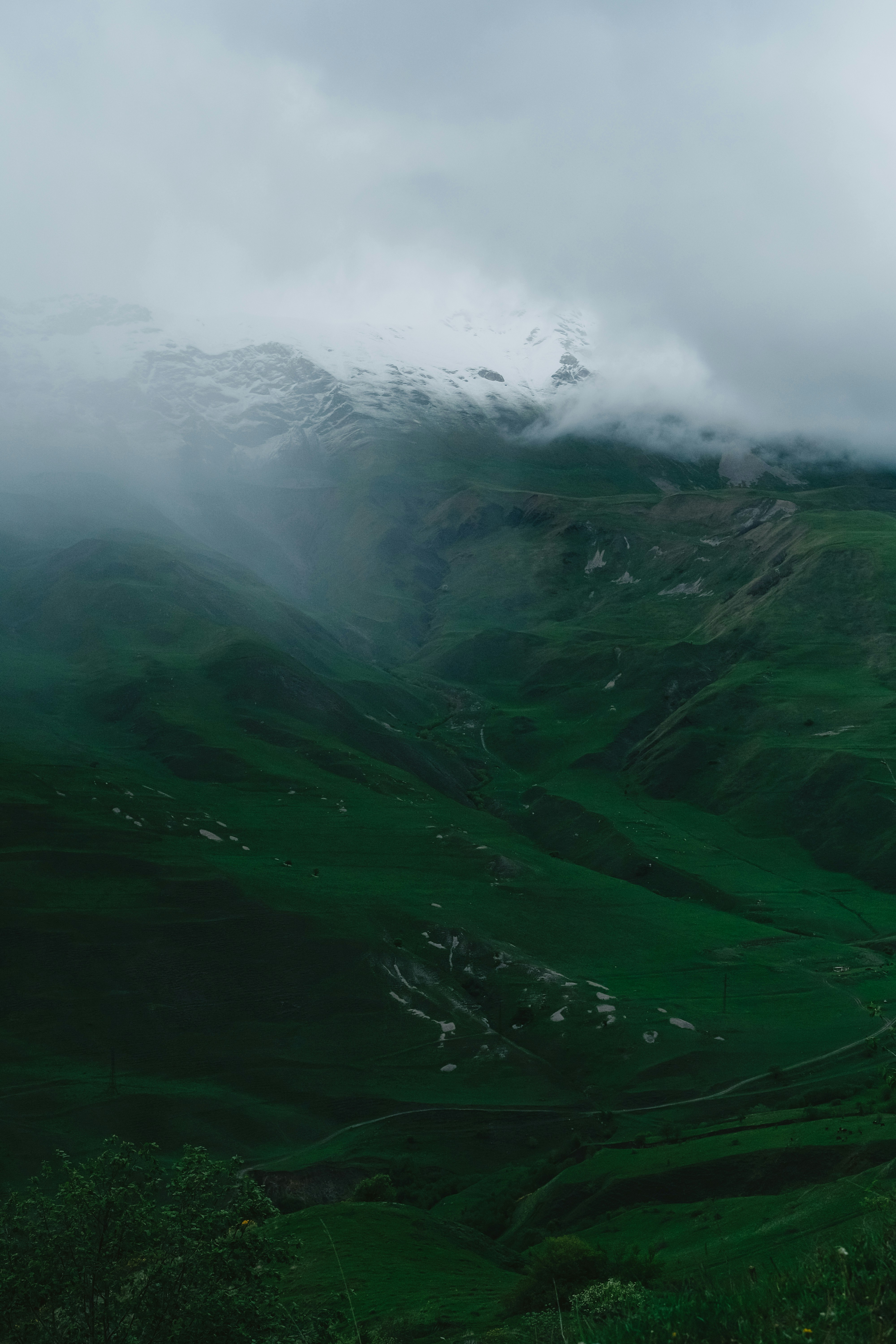A green valley with a river running through it photo – Free North ...