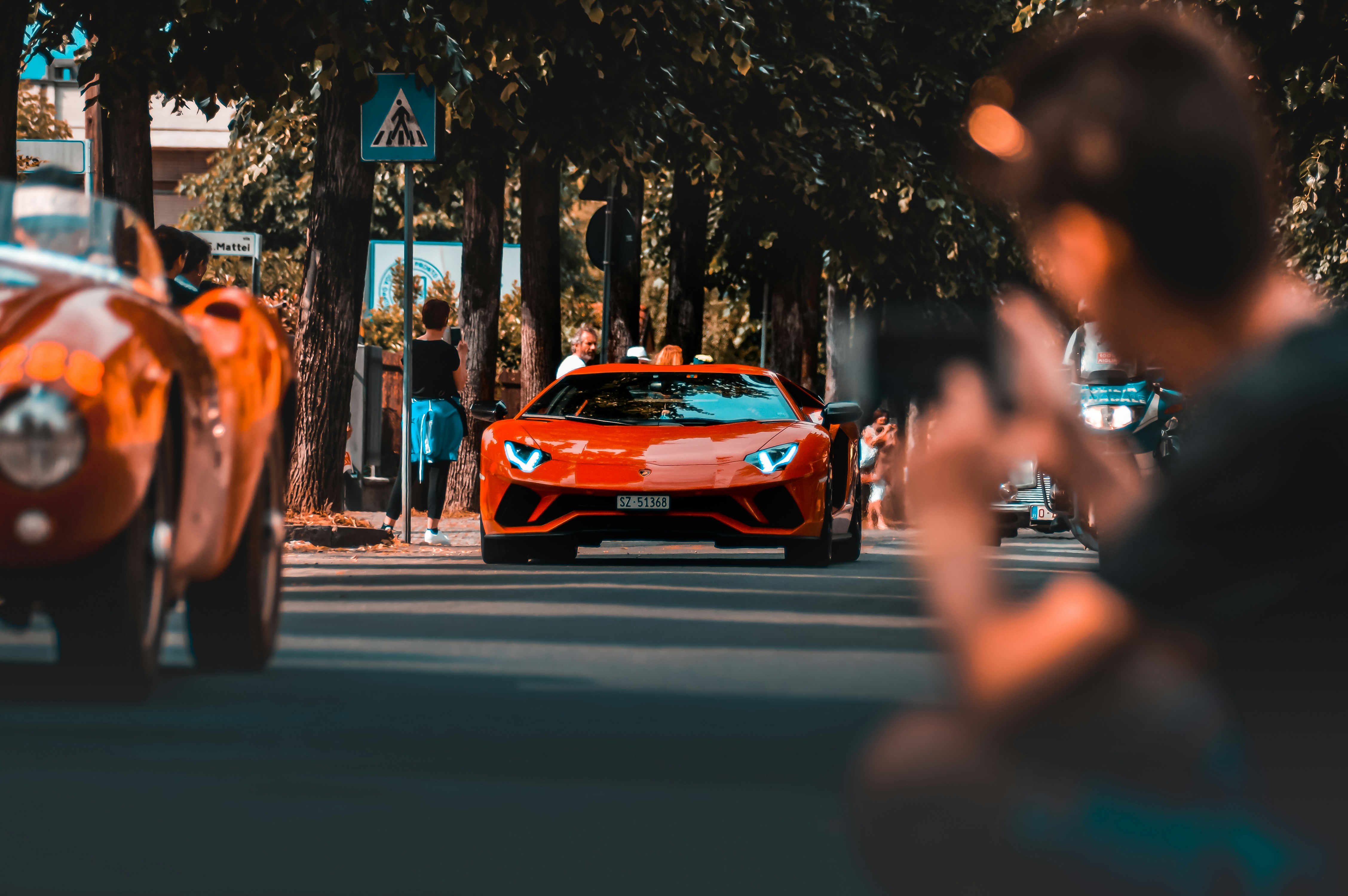 City Pulse: The Red Lamborghini Pierces Through a Sea of Blur