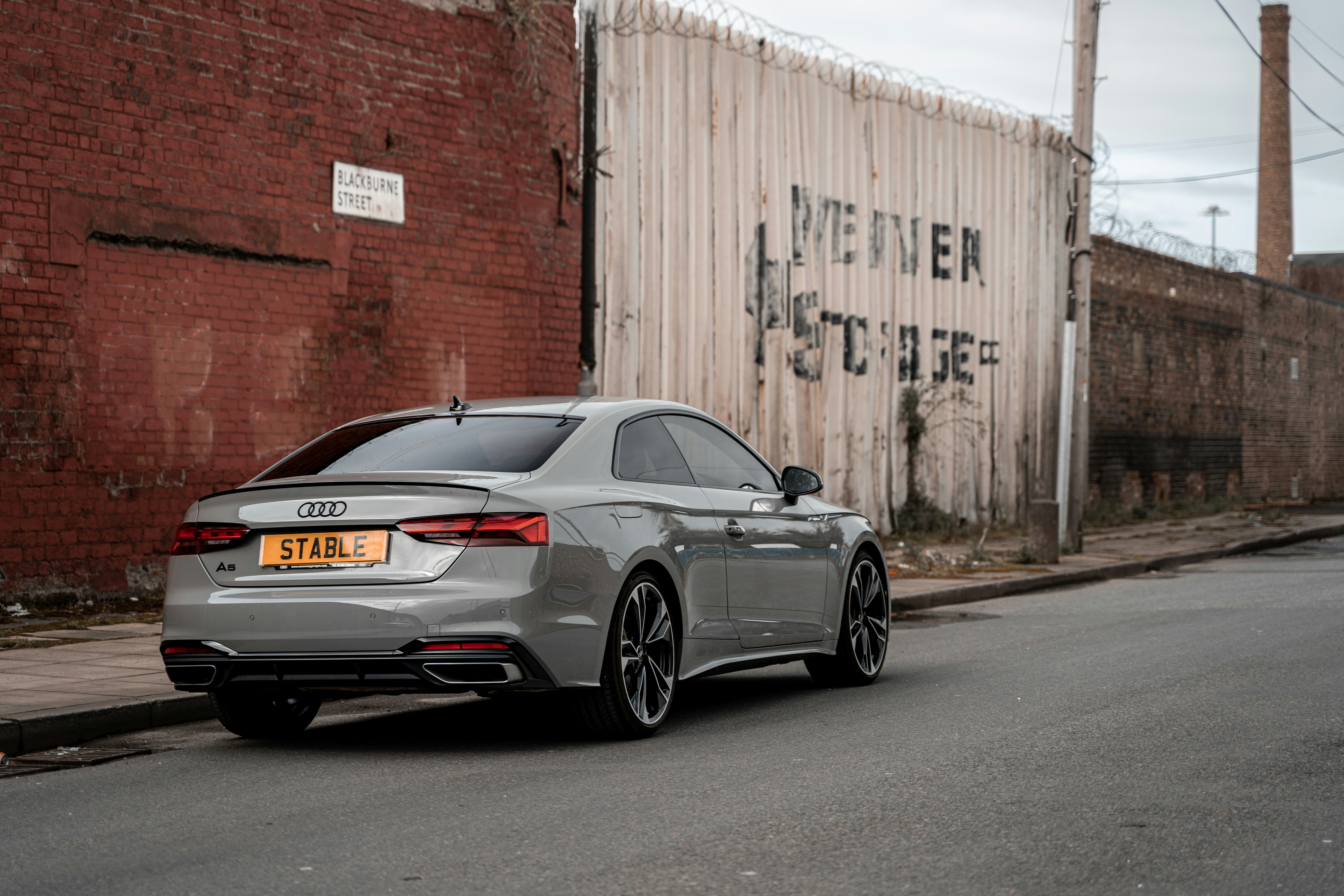 2022 Audi A6 Coupe in Quantum Grey | a silver car parked on the side of a road