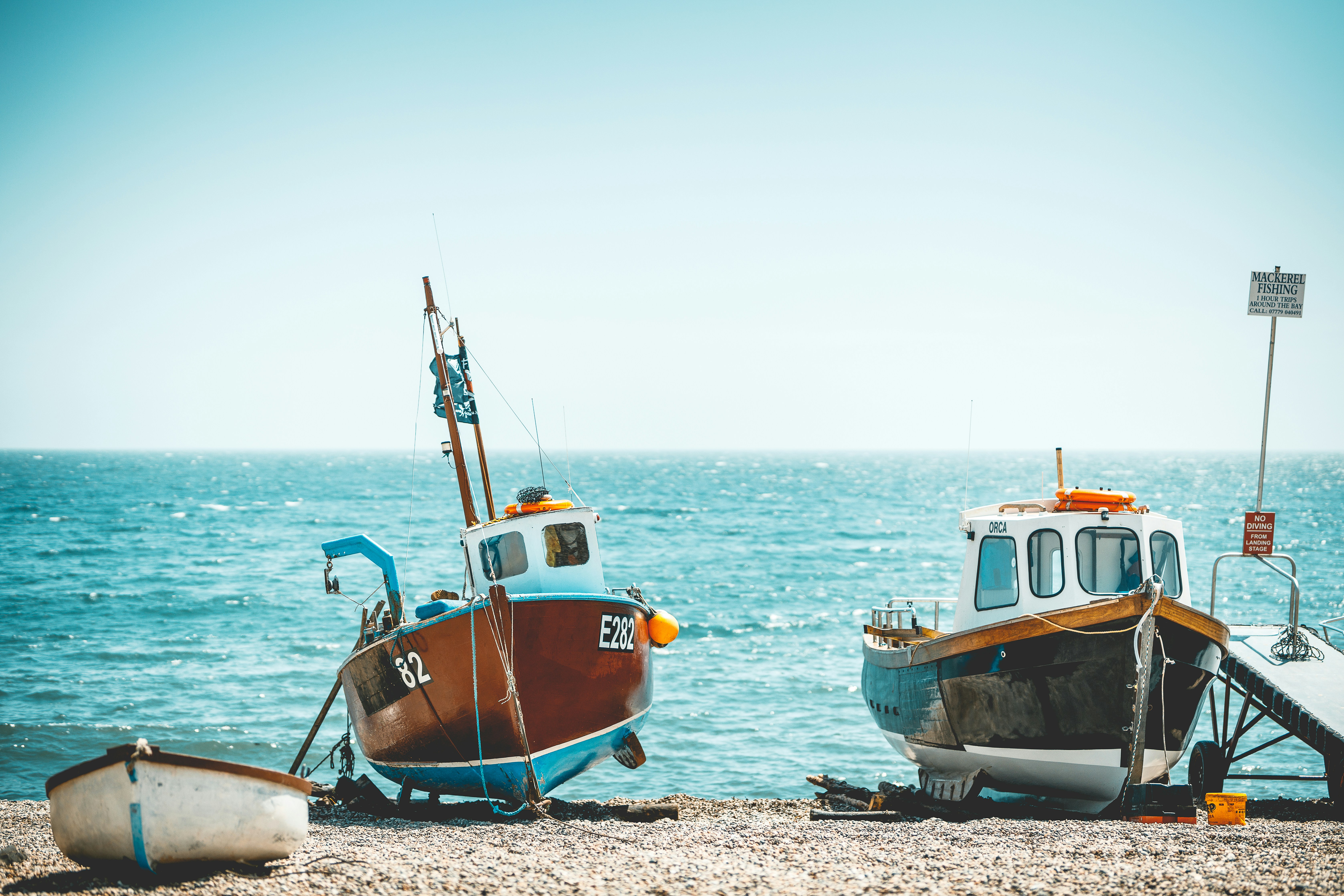 Foto Barcos en la playa – Imagen Devon gratis en Unsplash