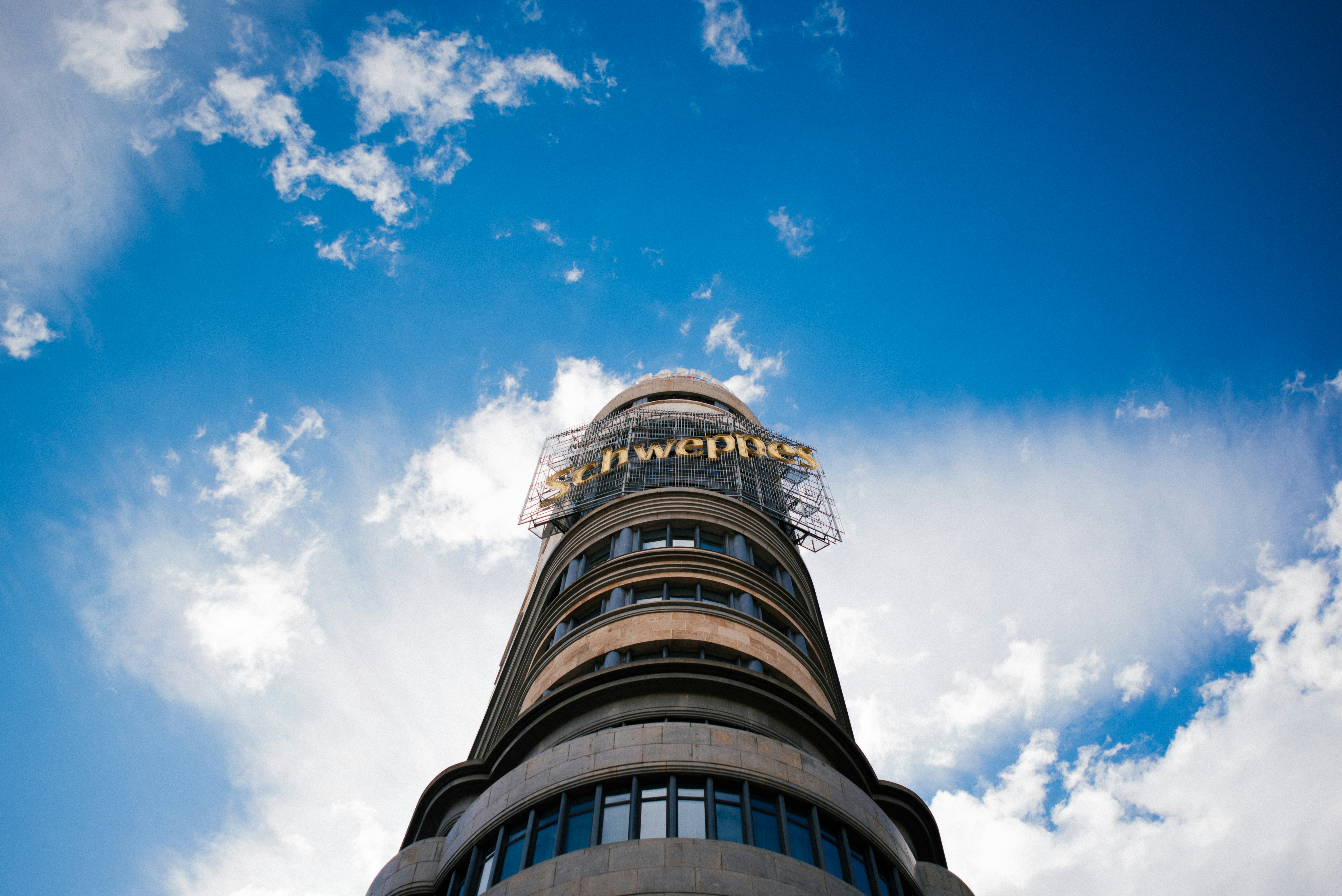 Apex of Circles: Tower Rising Against a Crystal Sky