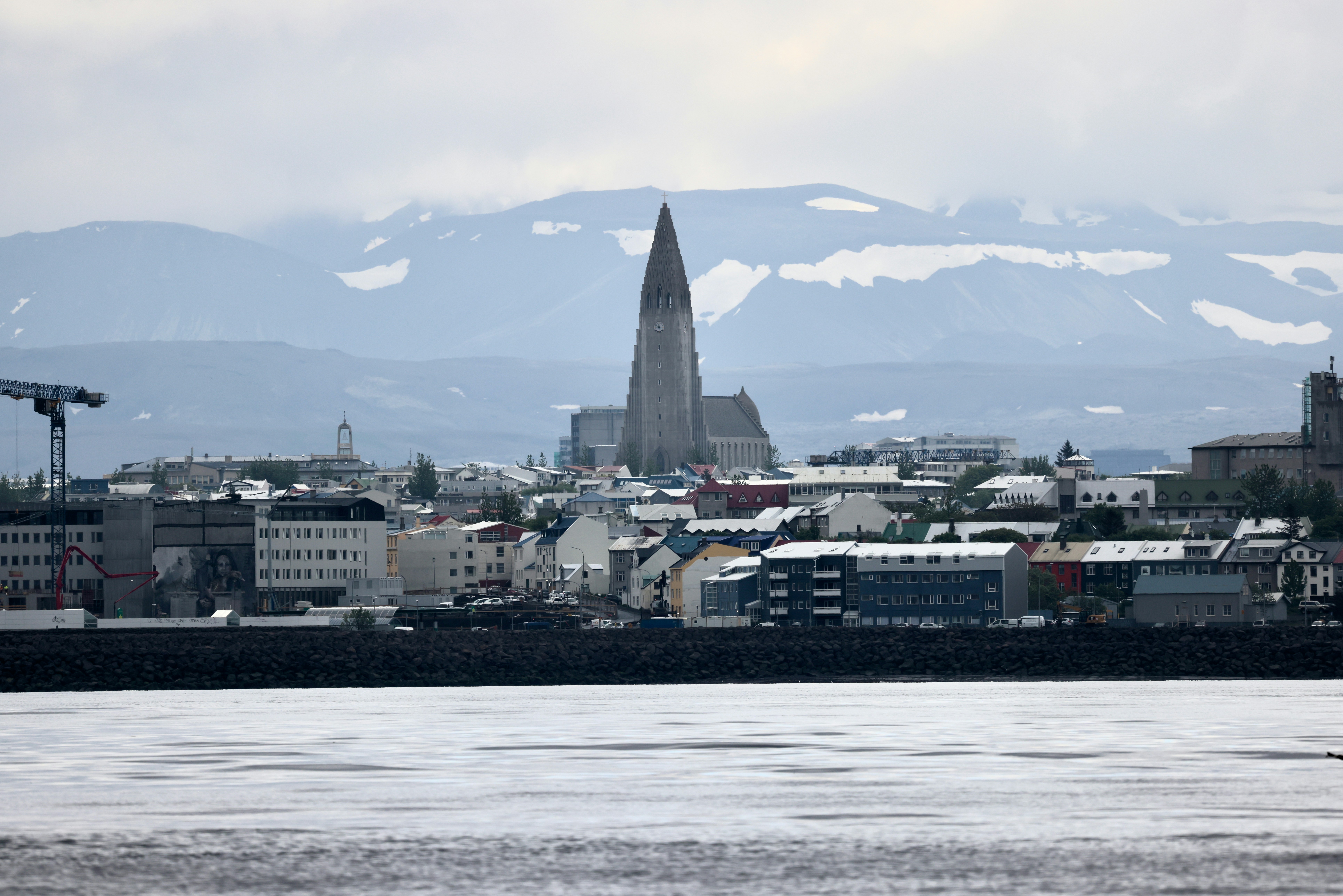 Island City and a Dark Spire—A Coastal Panorama