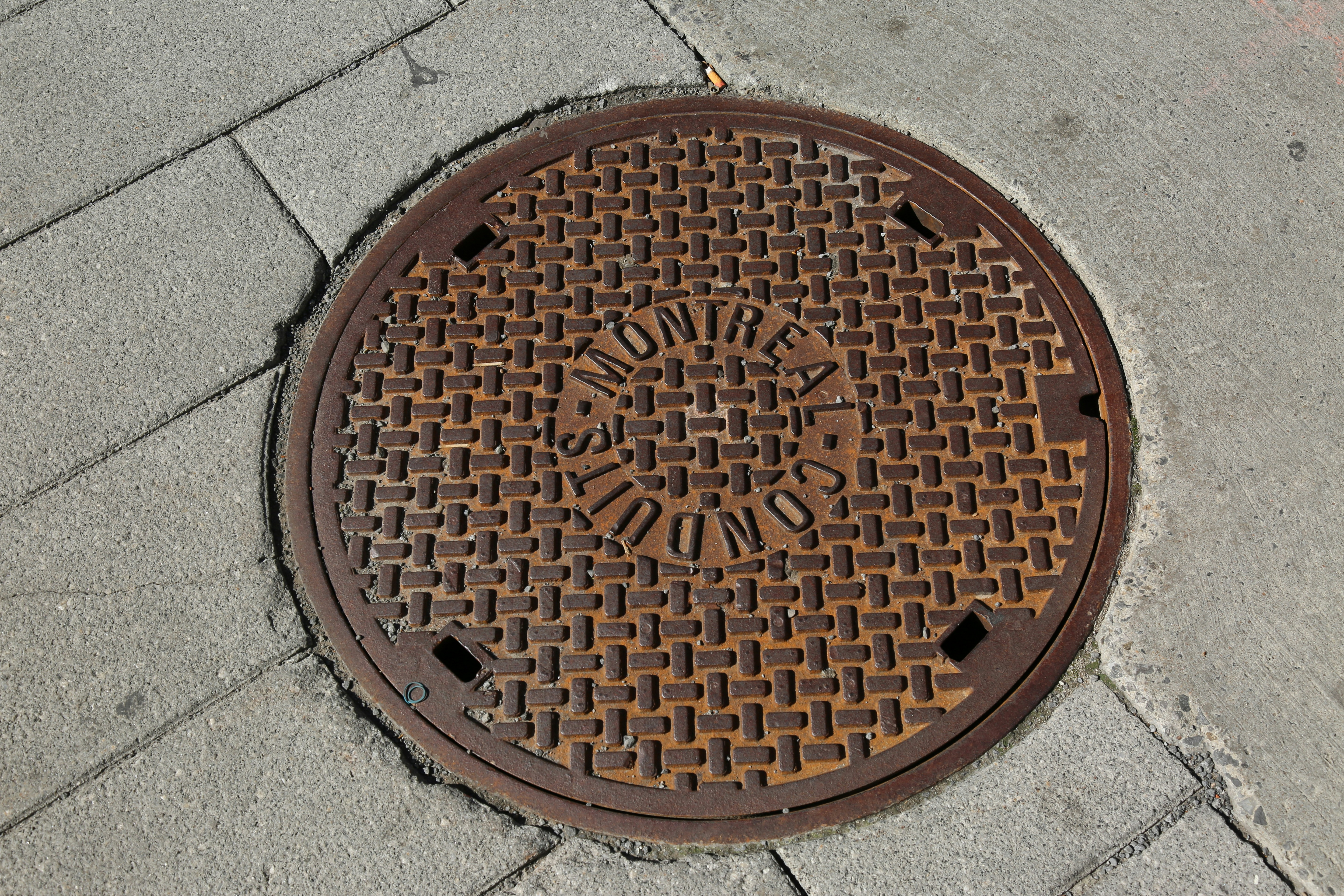 A round brown drain photo – Free Canada Image on Unsplash