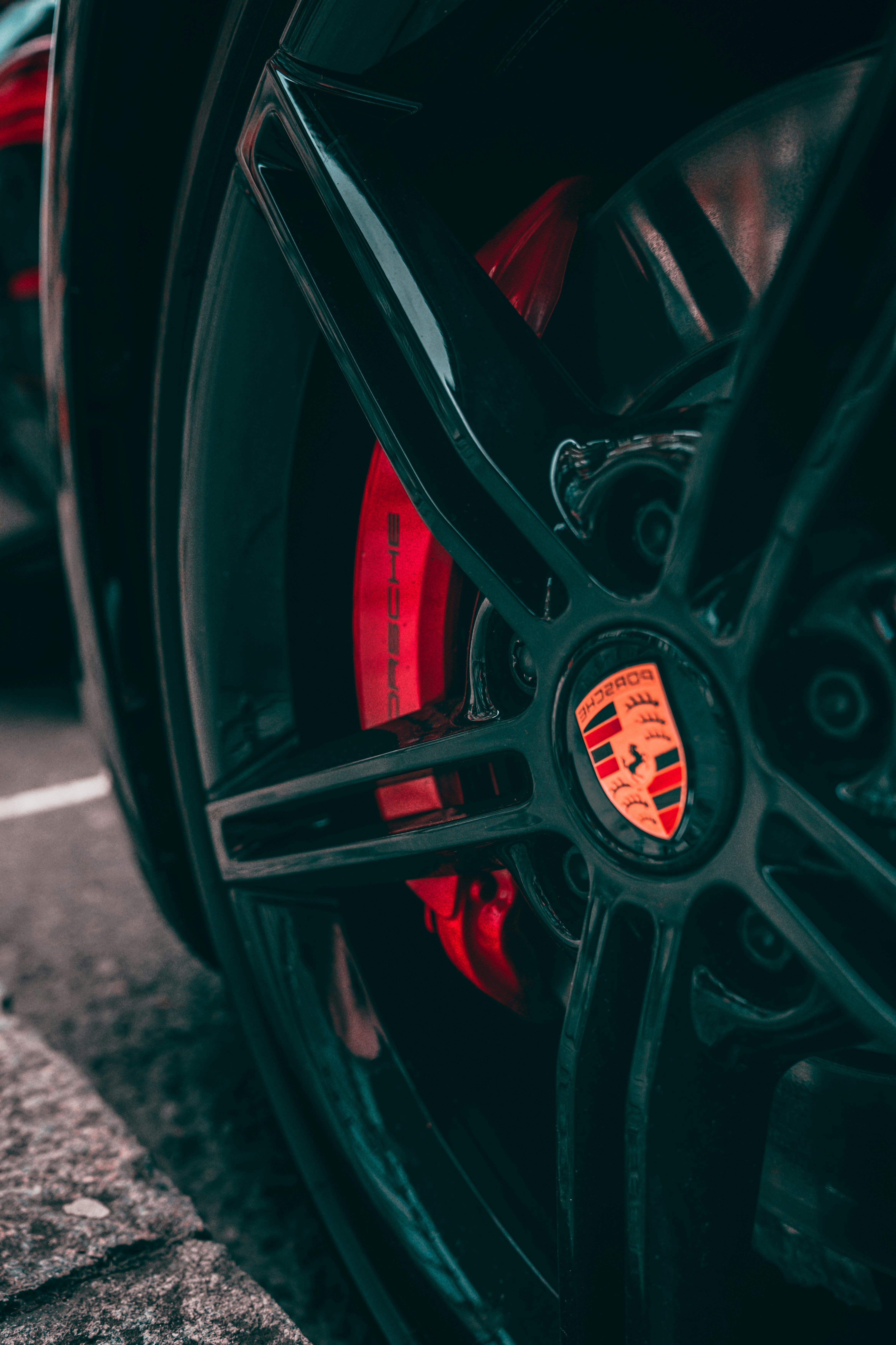Posrche wheel  | a close up of a car's dashboard