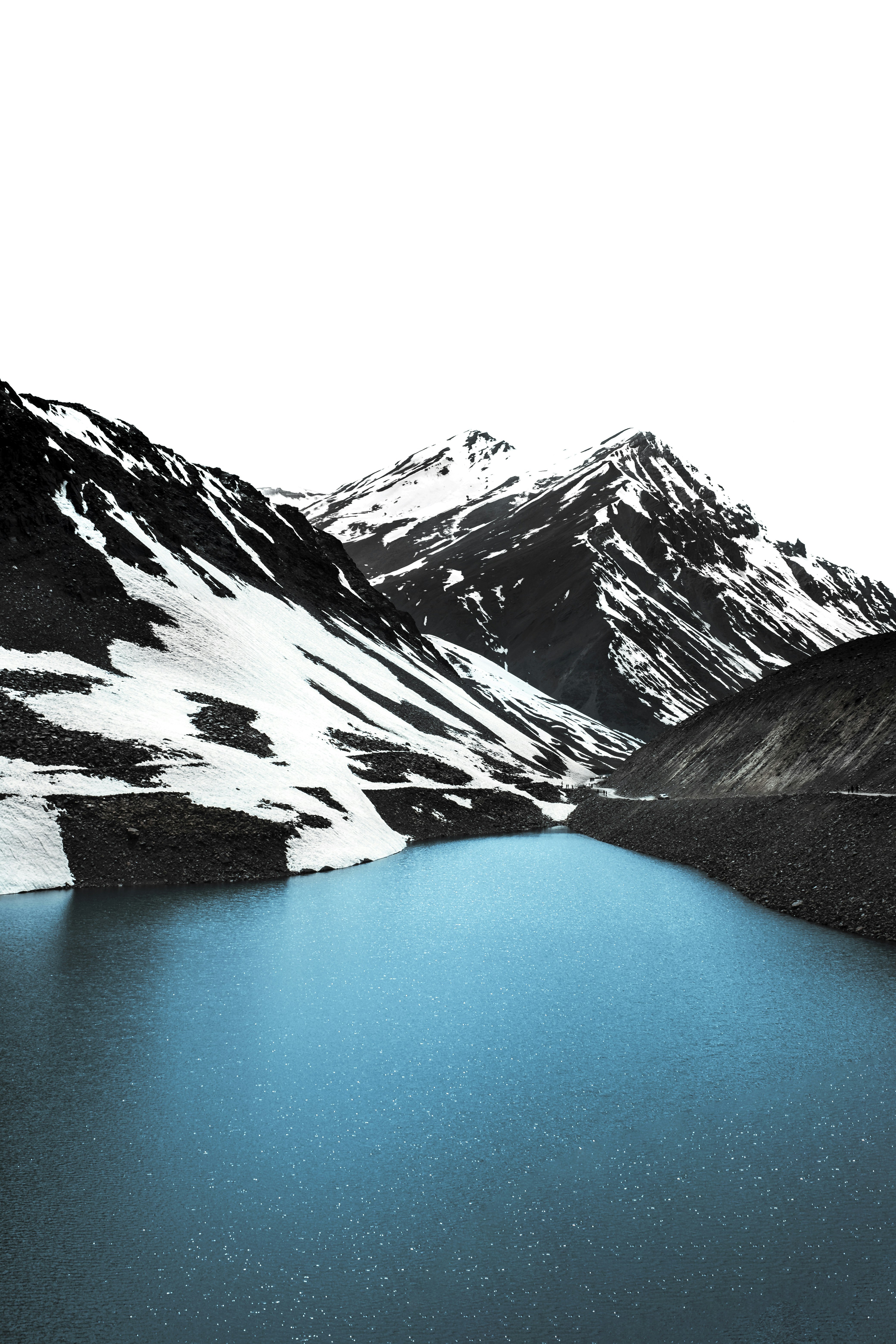 Turquoise Silence Beneath Snow-Crowned Peaks