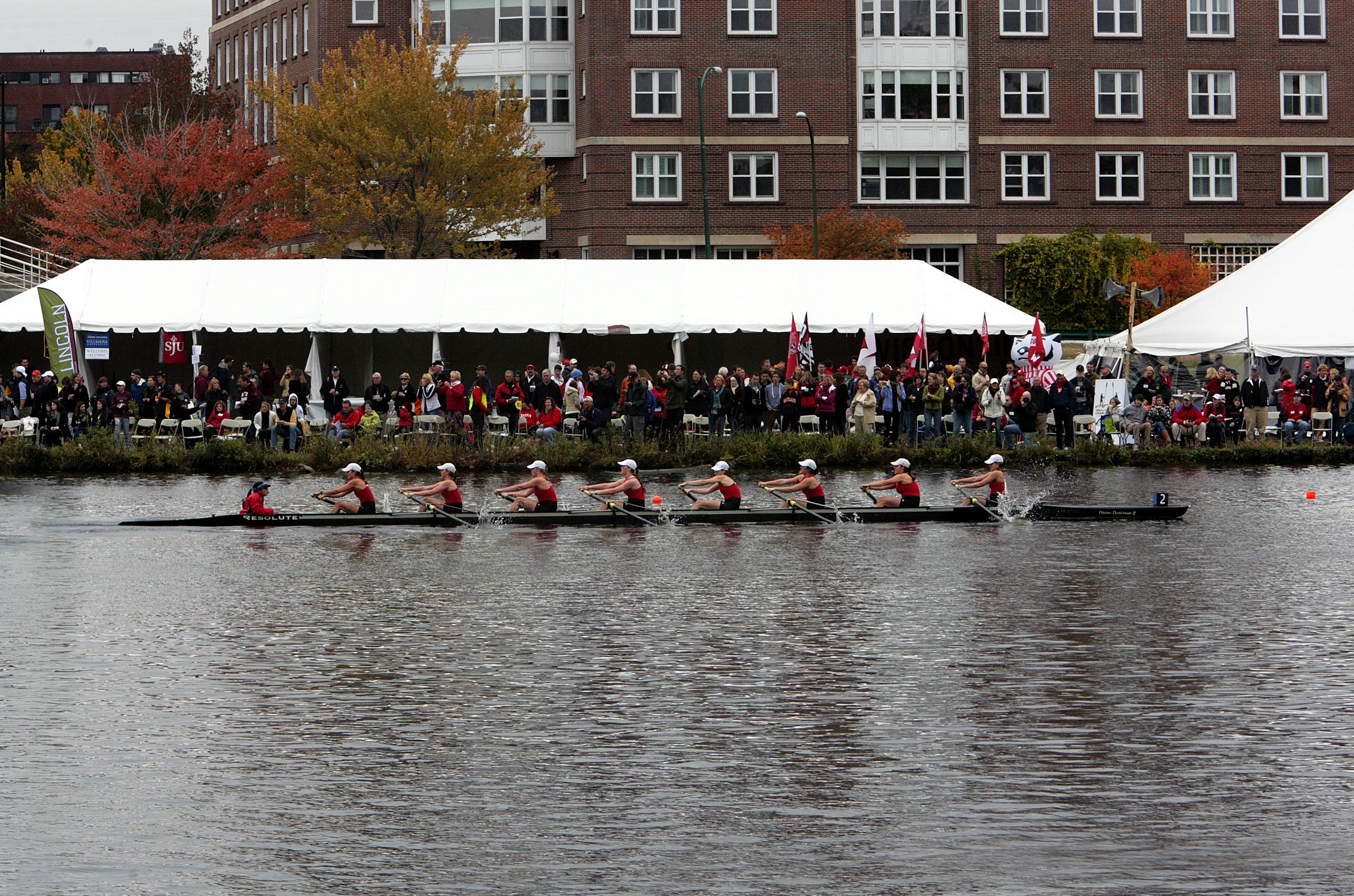 A group of people rowing a boat photo – Free Head of the charles ...