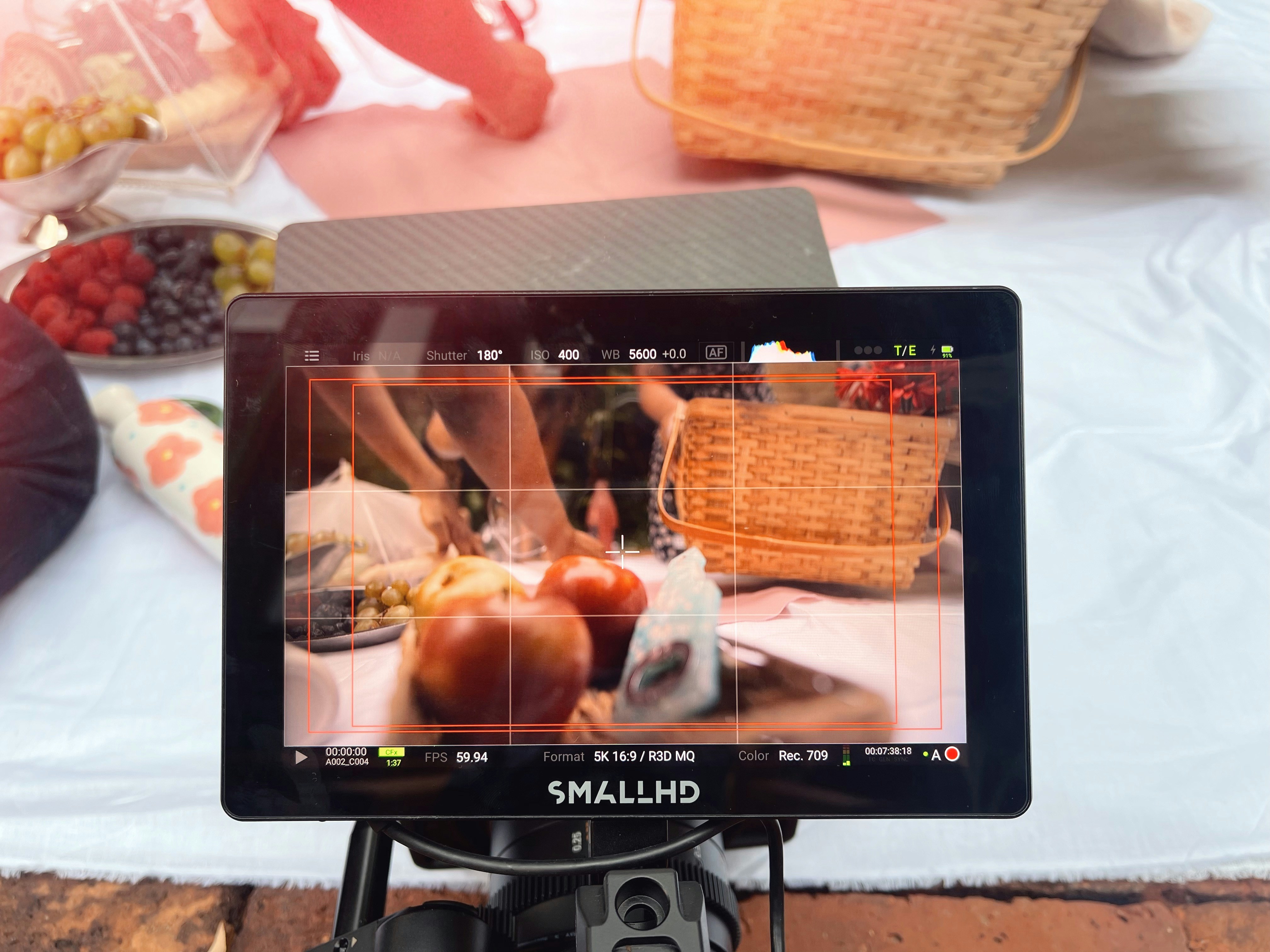Overhead Feast: A Camera Monitor Captures a Fresh Market Spread