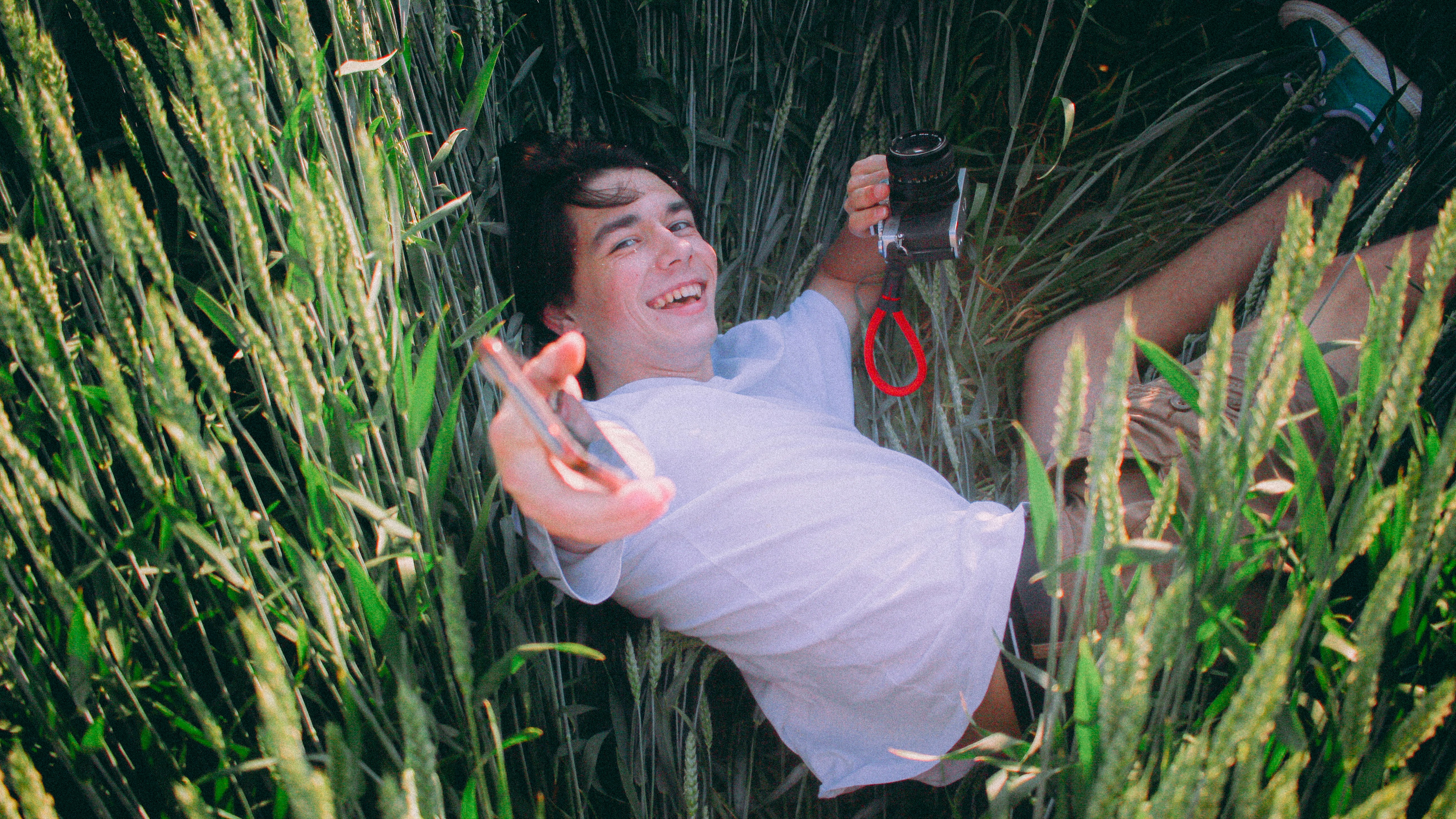 Midair Grin: A Sleepy Moment in the Tall Grass