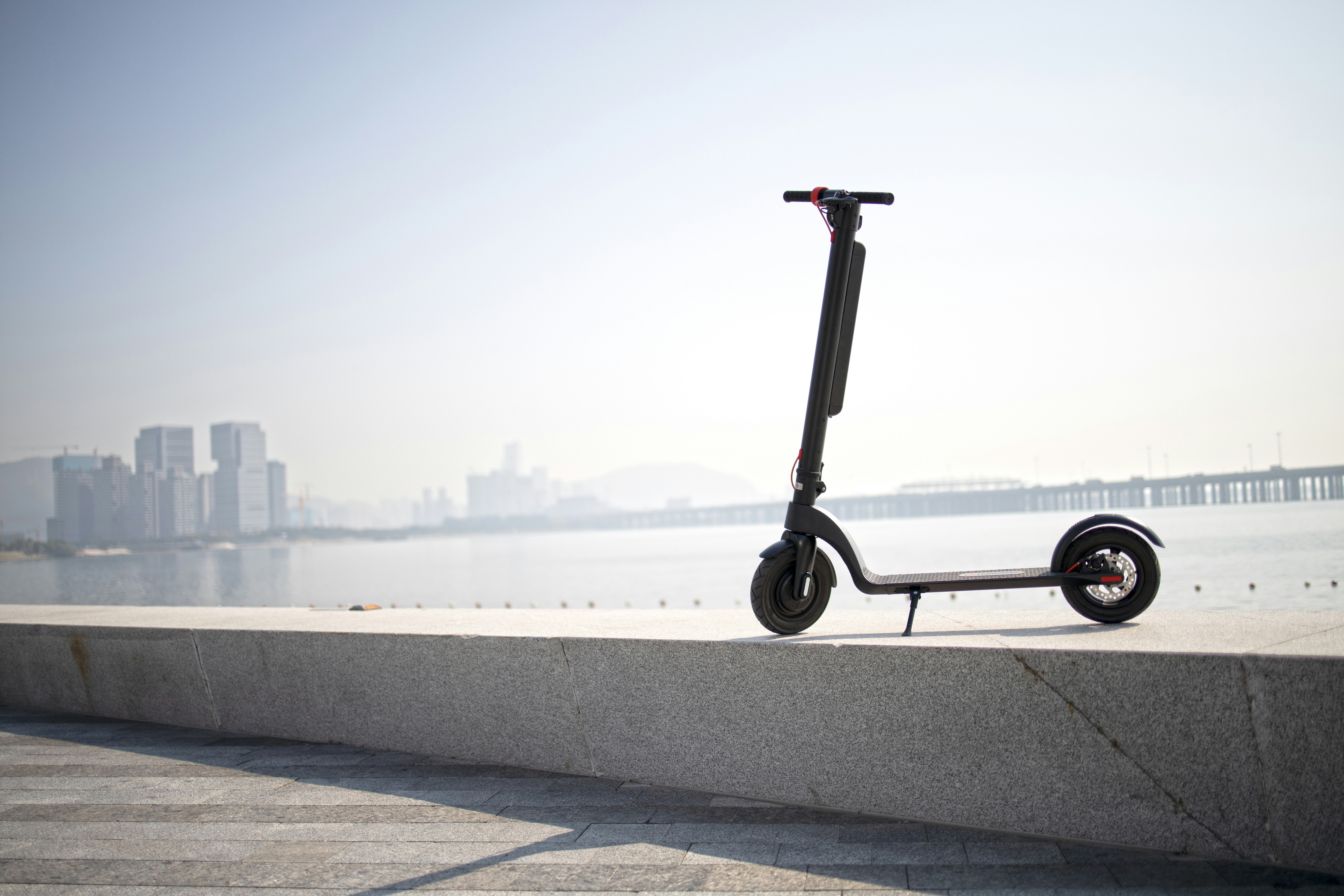A bike on a concrete ledge photo – Free Scooter Image on Unsplash
