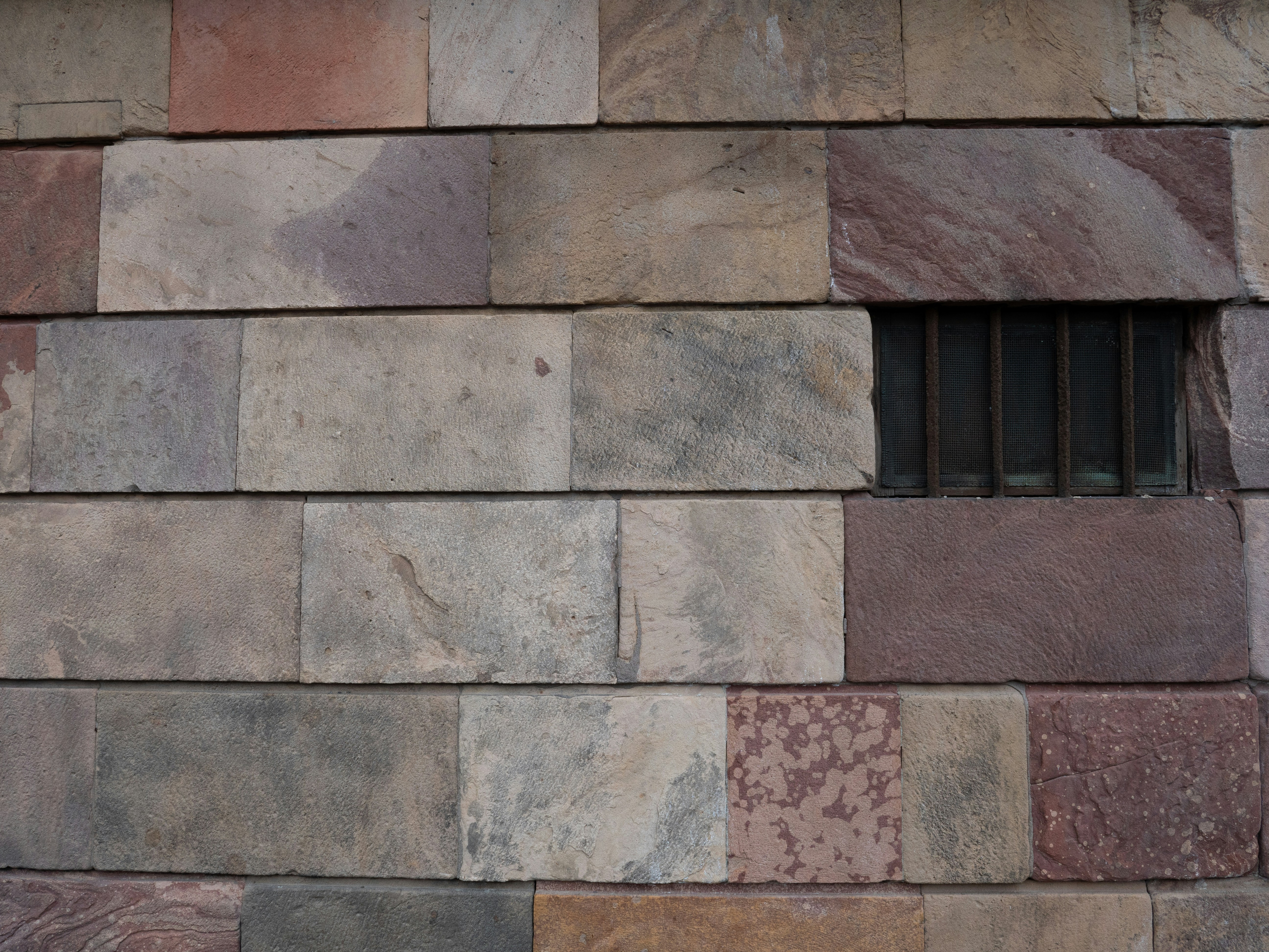 a brick wall with a window