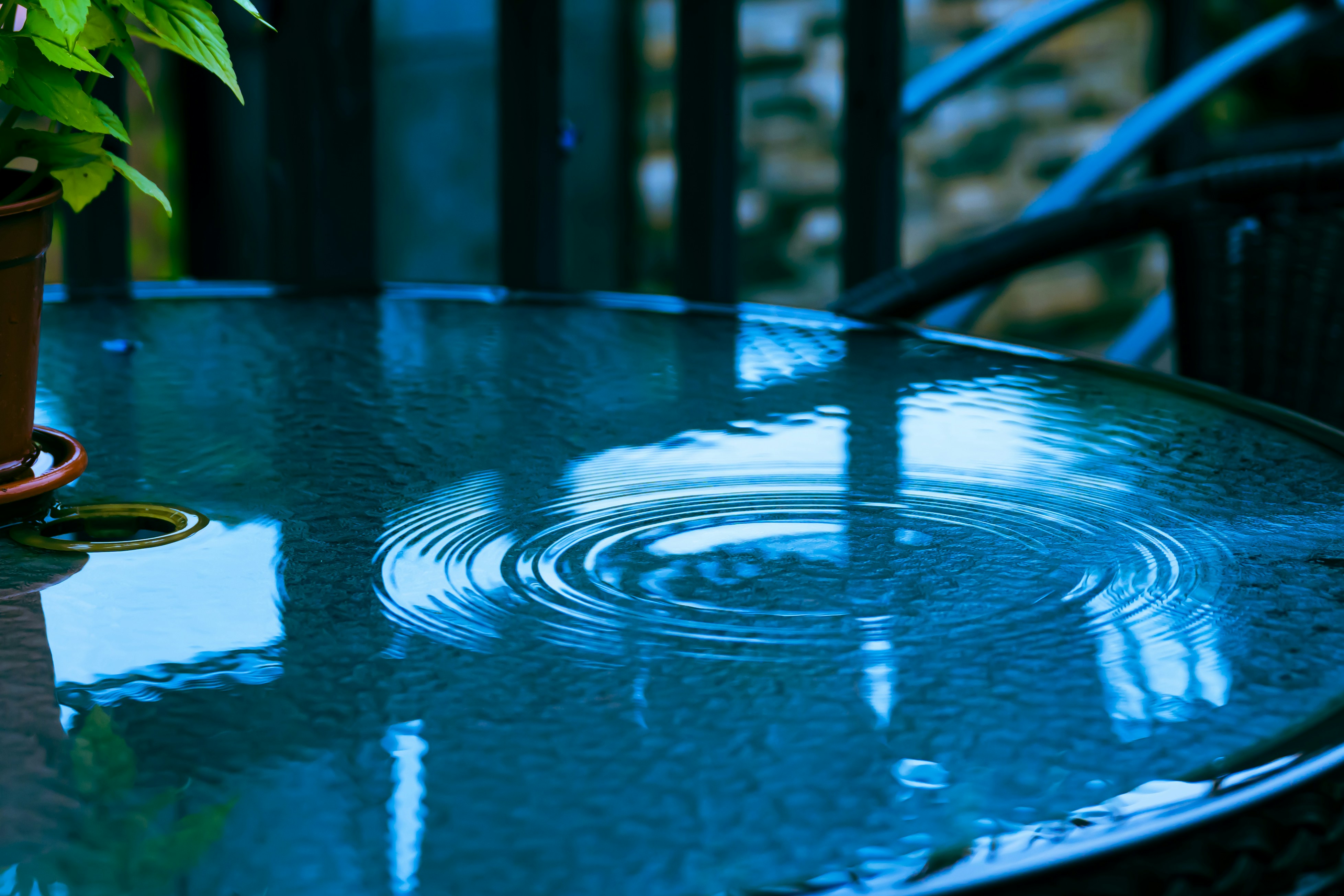 Raindrop Ring on Glass Table in Afternoon Light