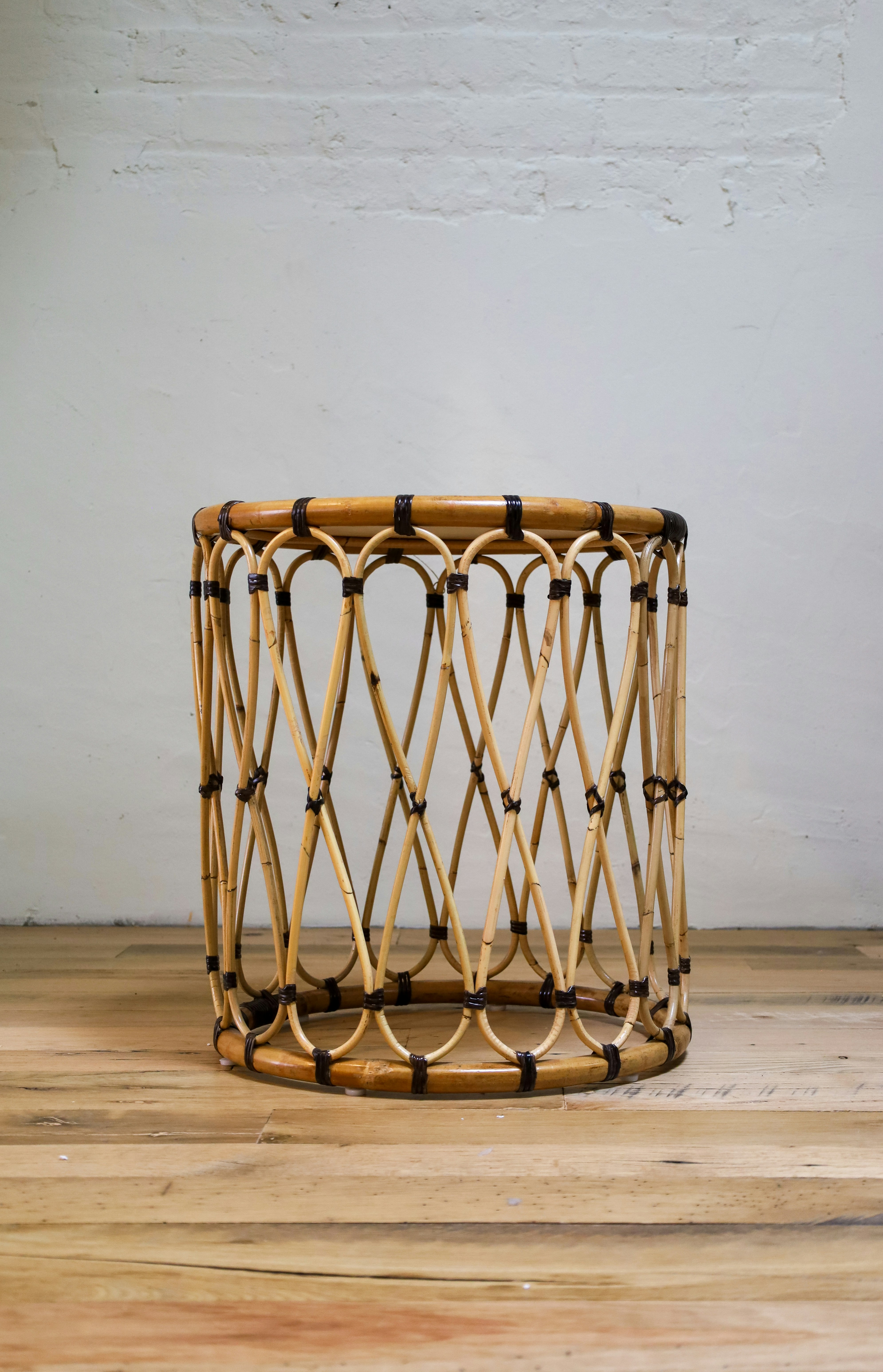 A yellow cage on a wood floor photo – Free Brown Image on Unsplash