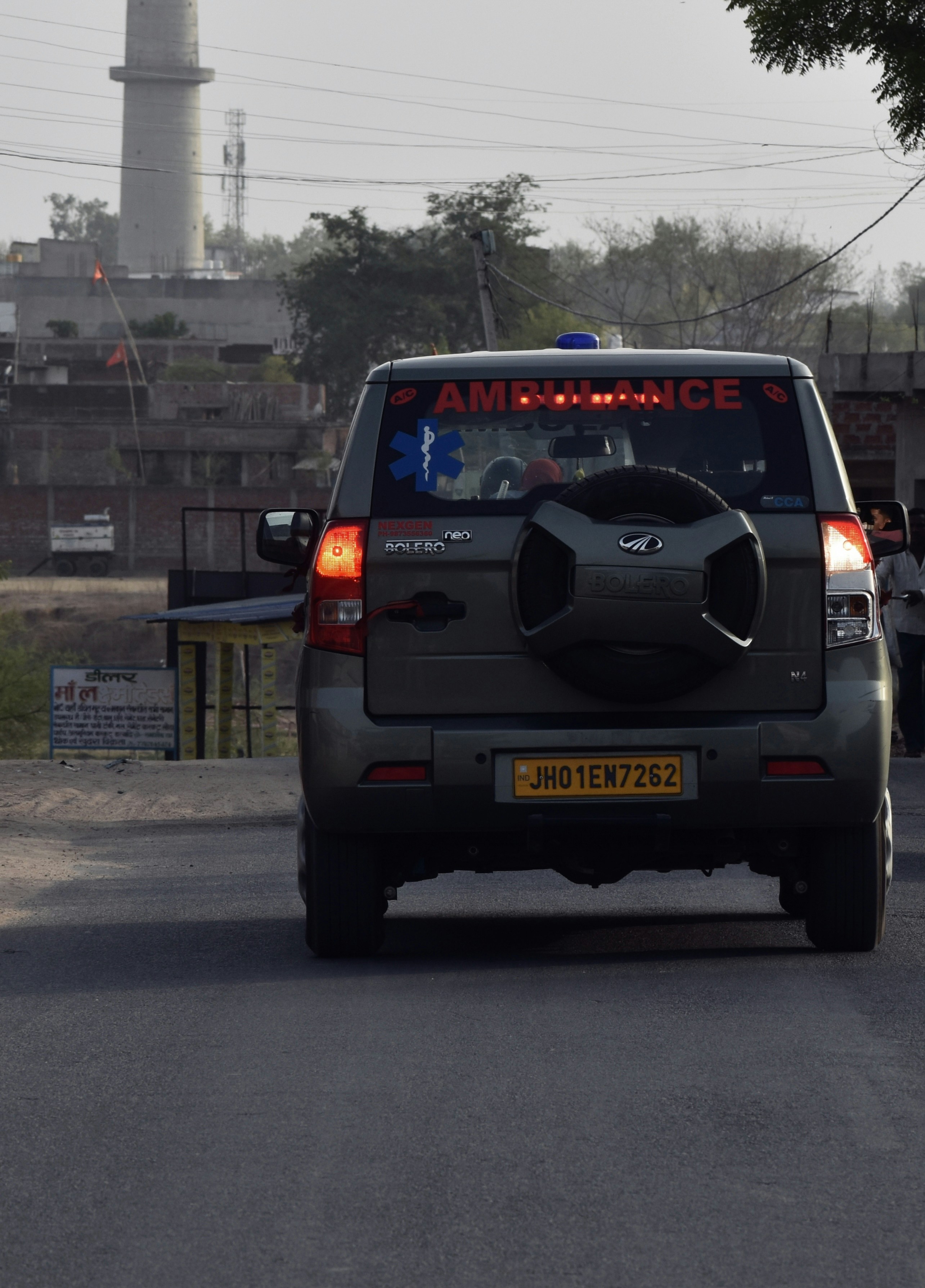 Rear-View Ambulance on a Quiet Indian Road