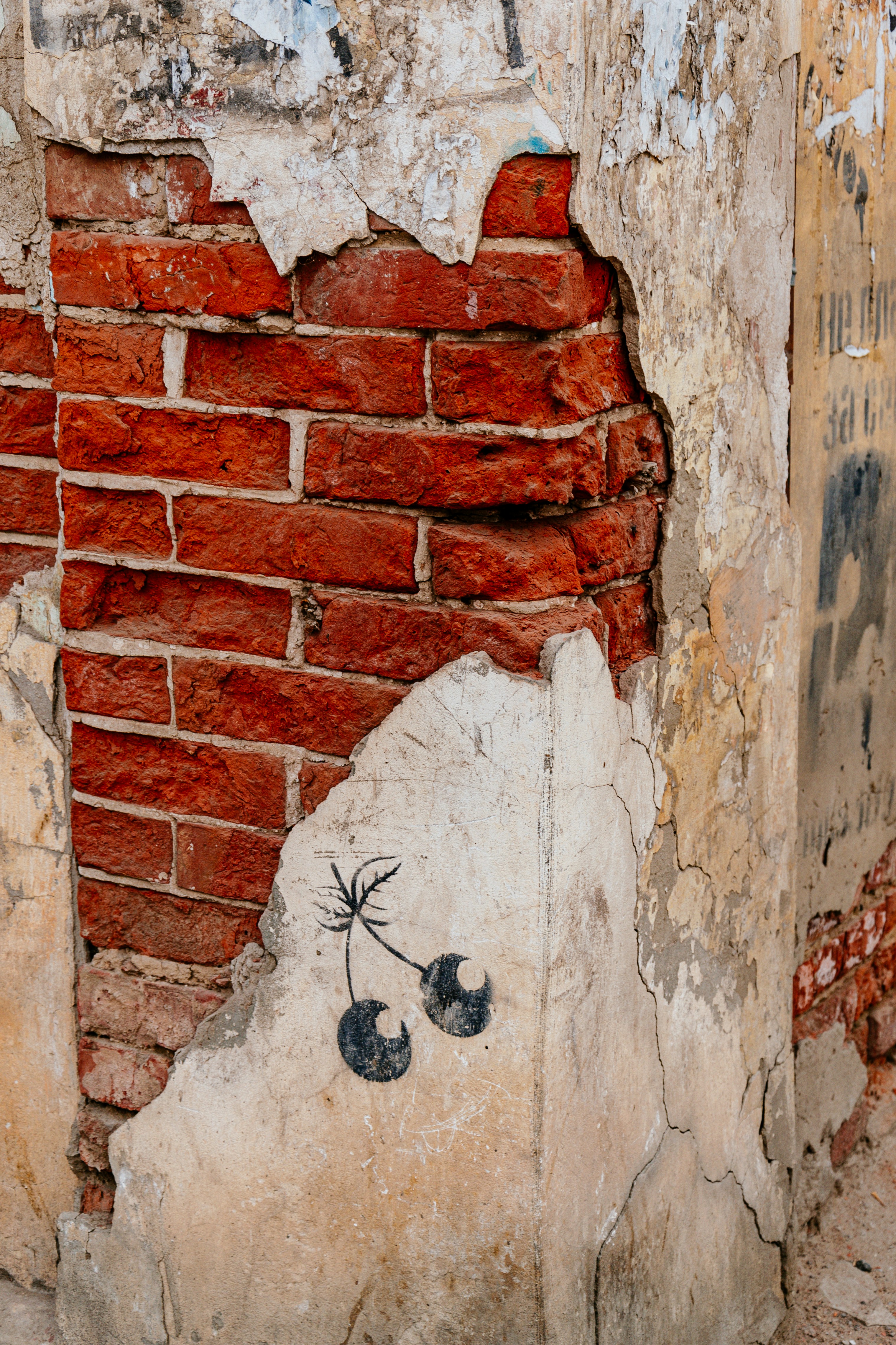 a brick wall with a hole in it