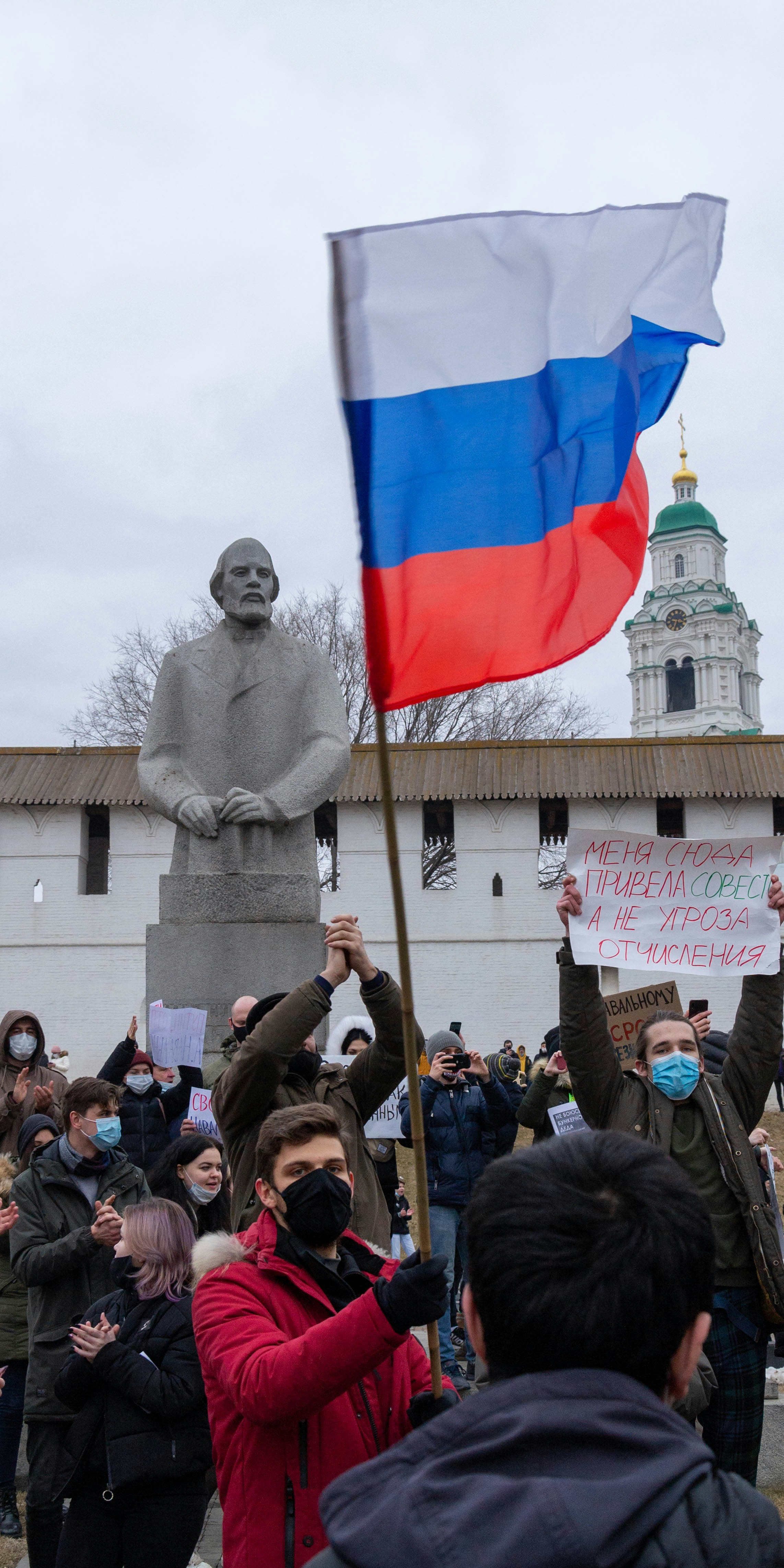 Flag Over Gathering: A Protest Spearhead in Front of a Historic Landmark