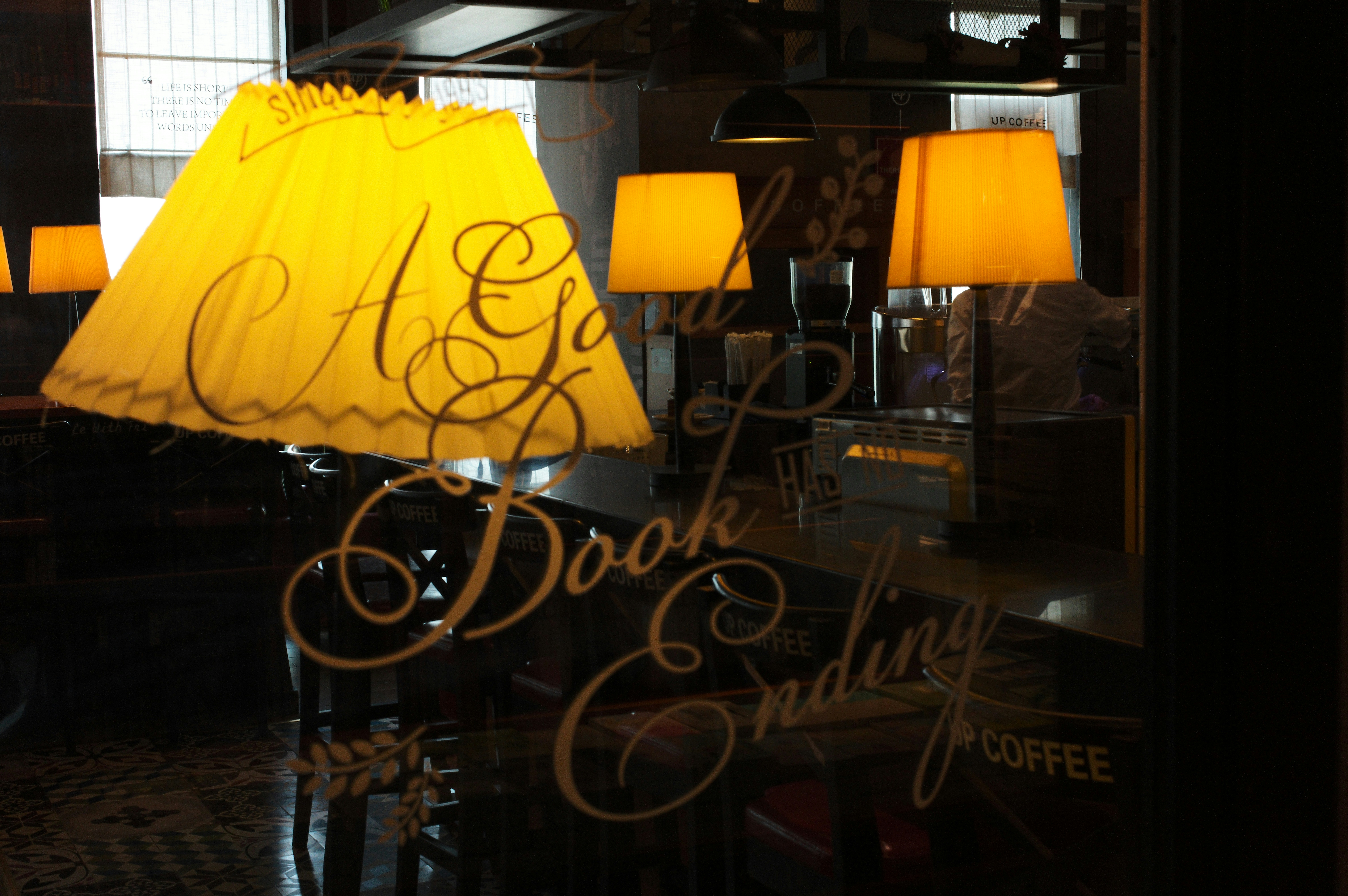 Amber Lamps in a Quiet Coffee Corner