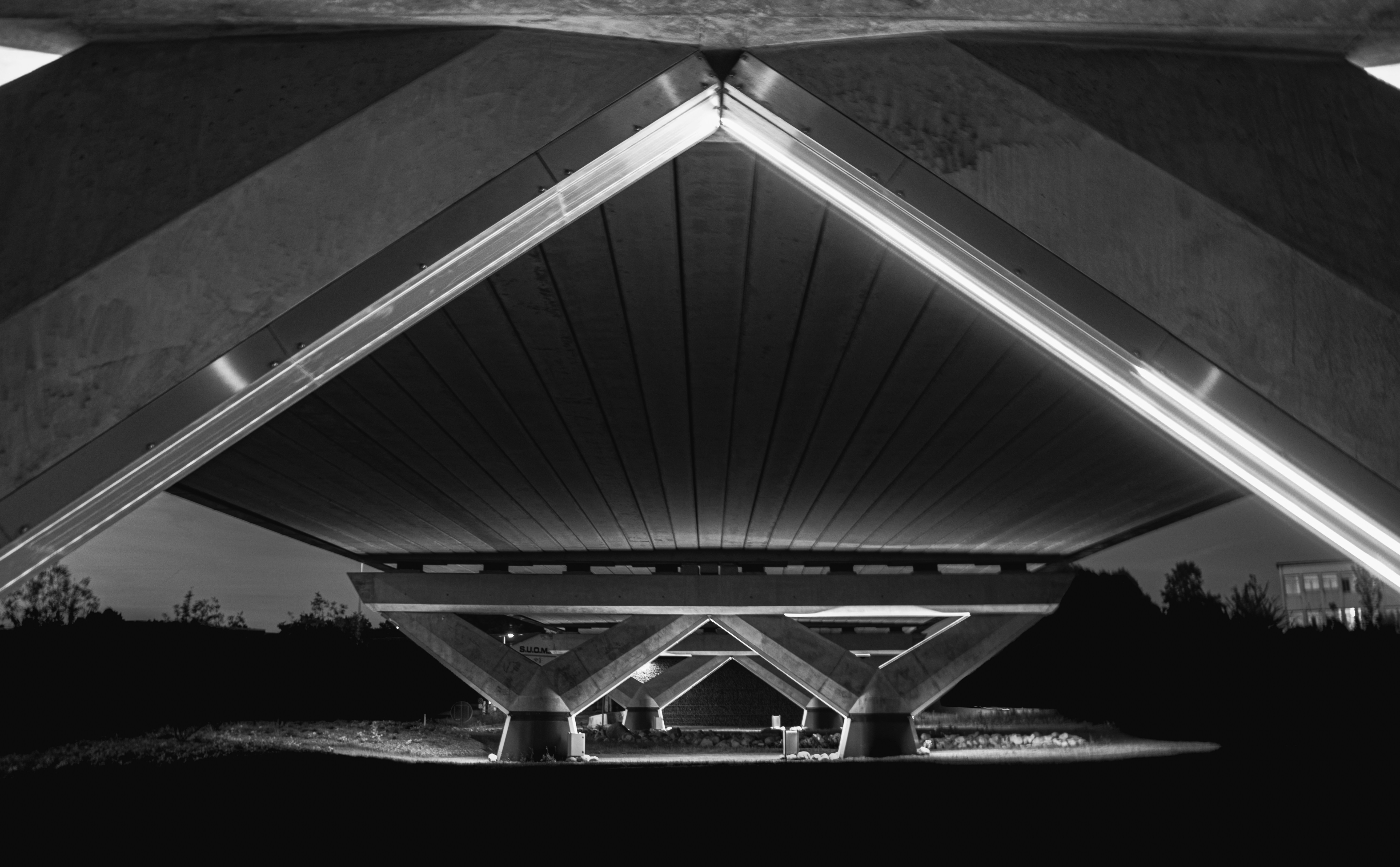 Apex of Light: Geometric Symmetry Under a Cantilevered Structure