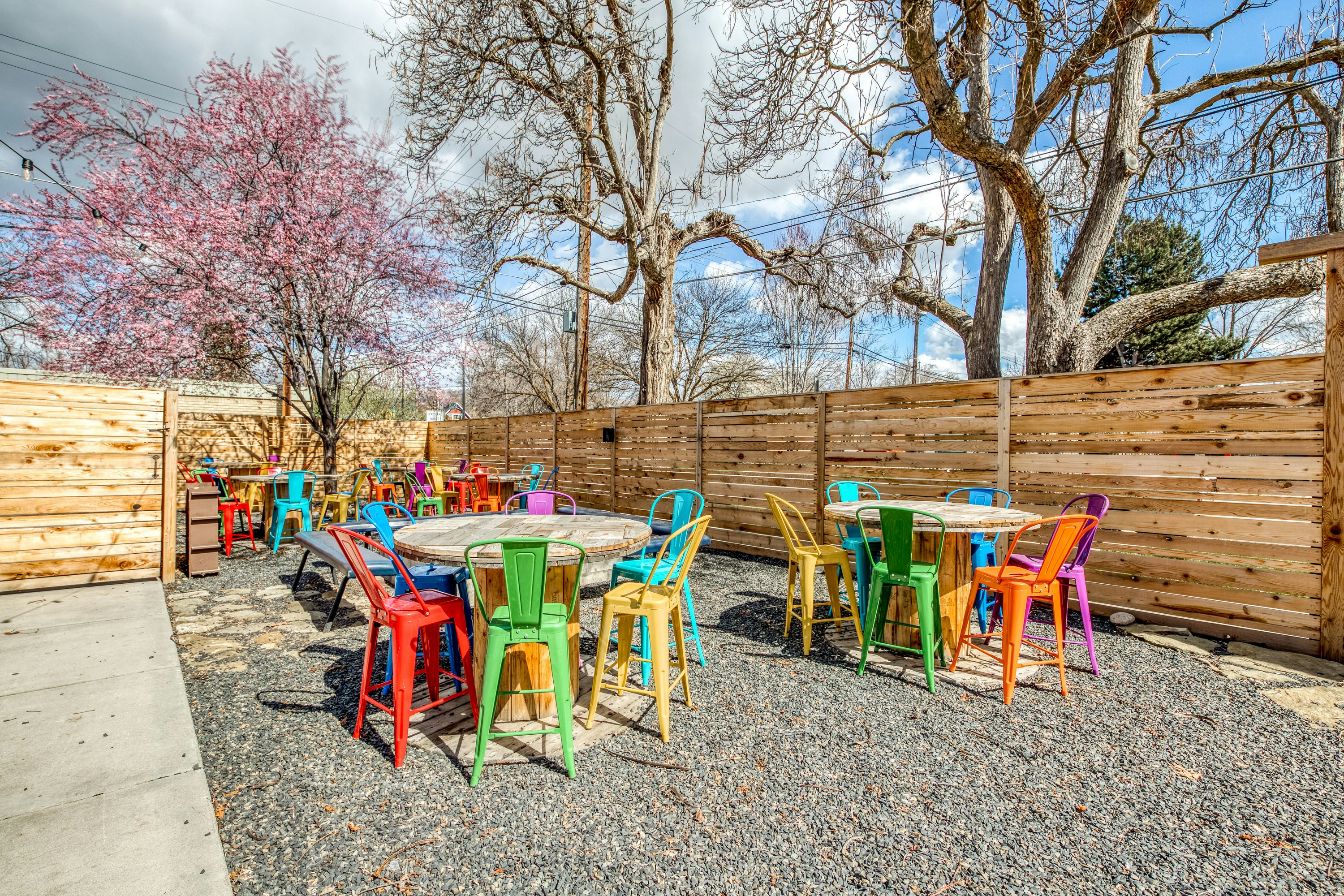 Rainbow Seating in a Sunlit Courtyard