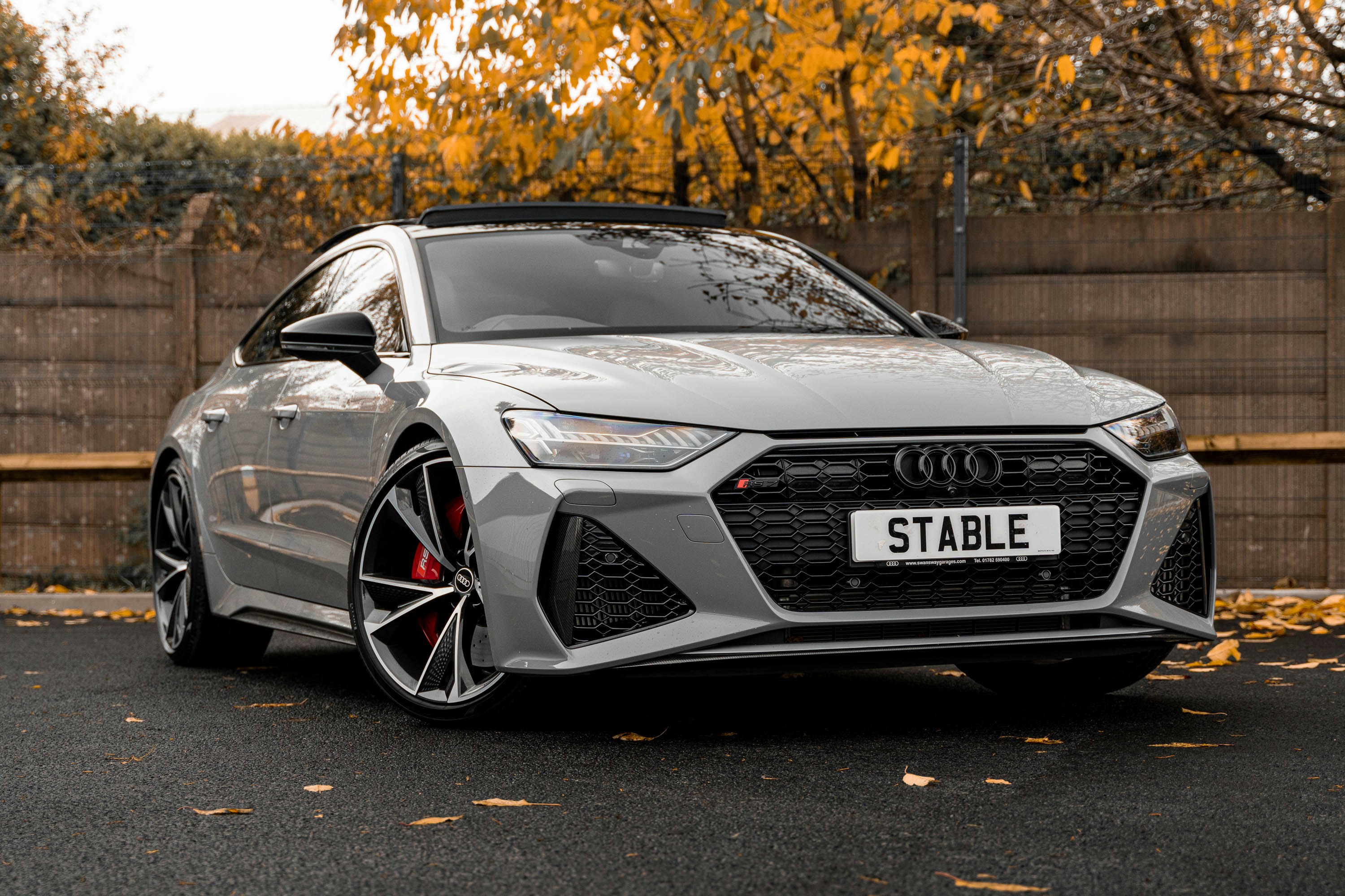 A silver car parked on a street photo – Free 2021 audi rs7 sportback ...