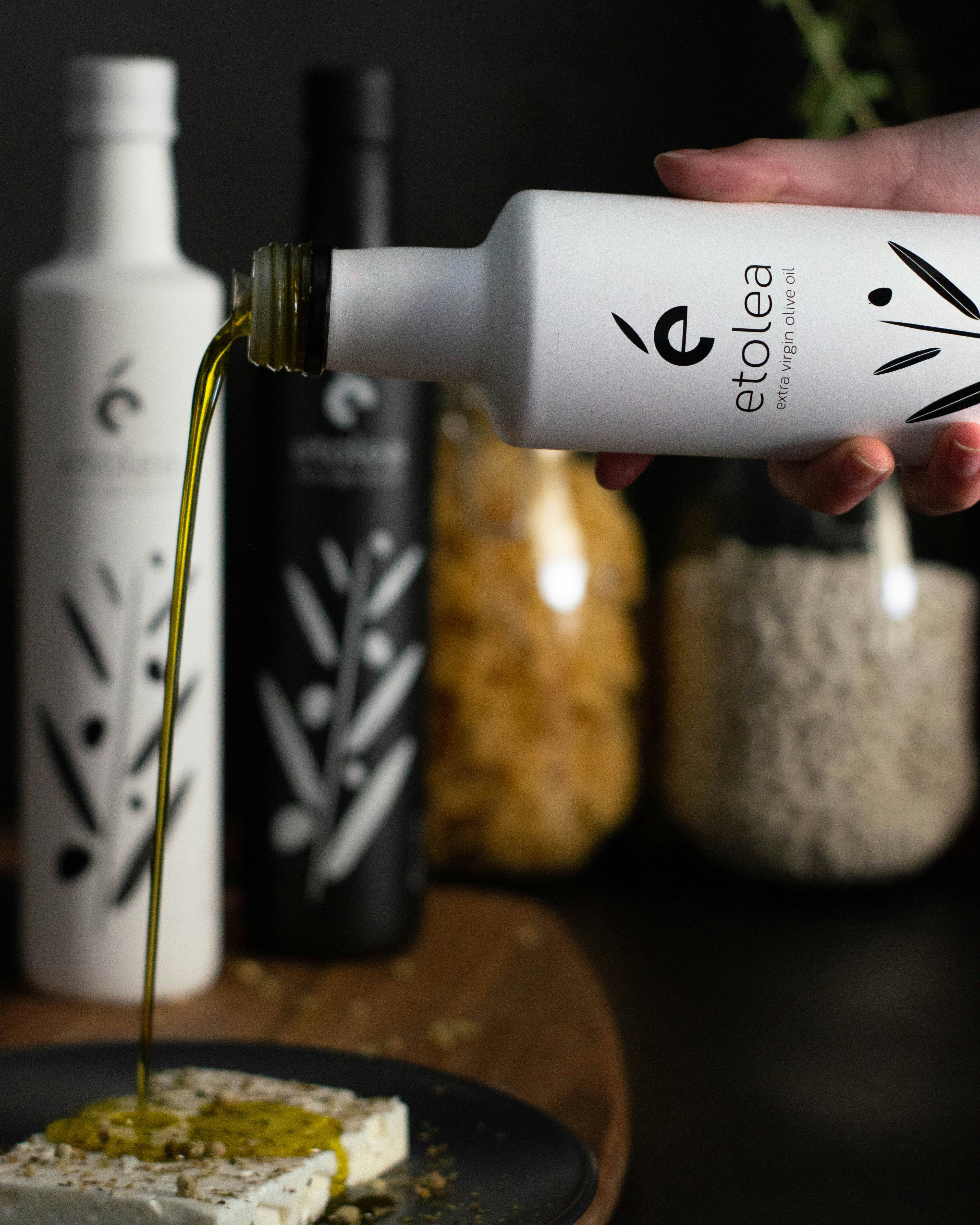 Ribbon of Gold: Pouring Etolea Olive Oil onto a Cheese Plate