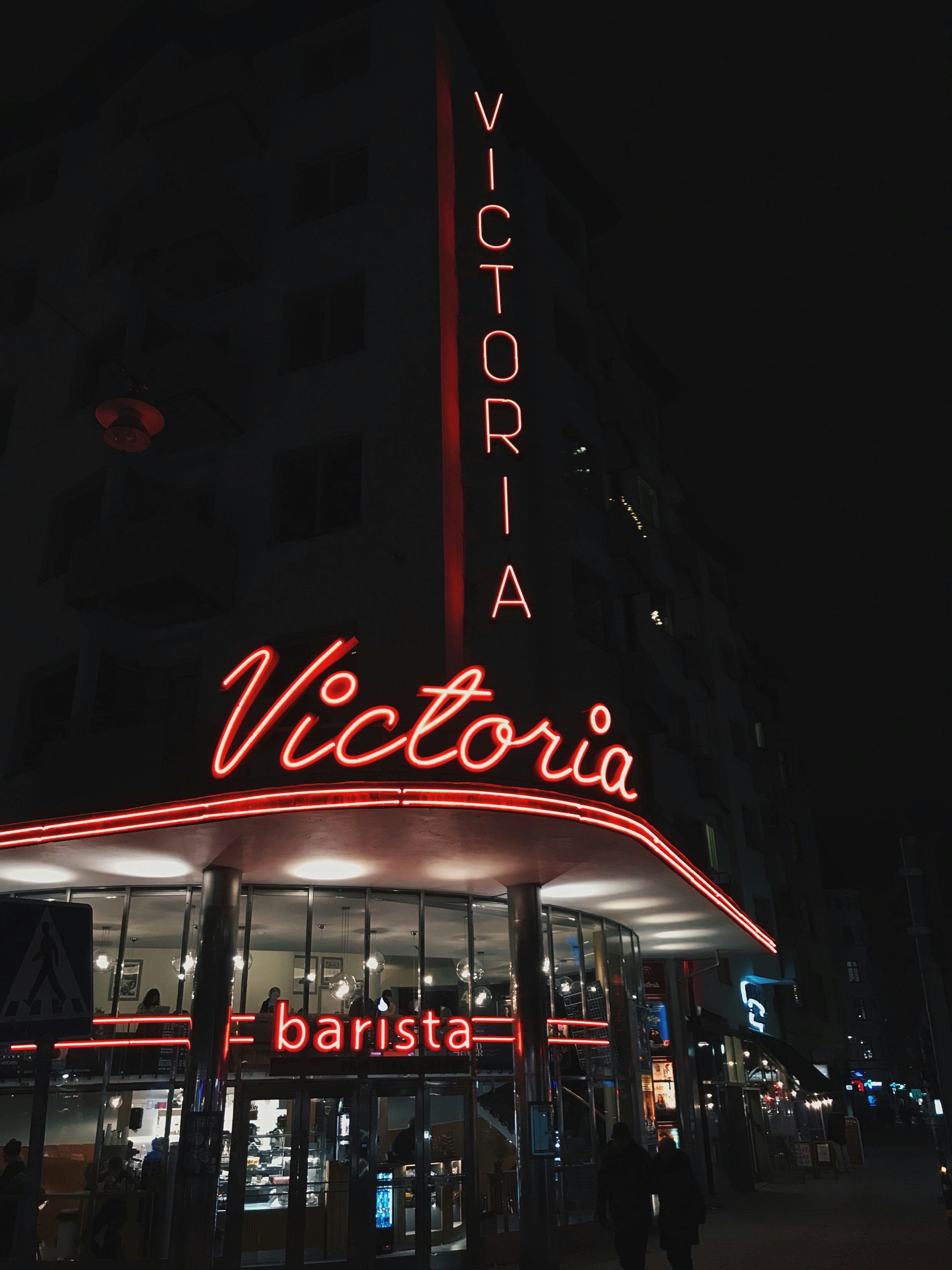 Neon Victoria: Night Glow at a Classic Cinema Corner