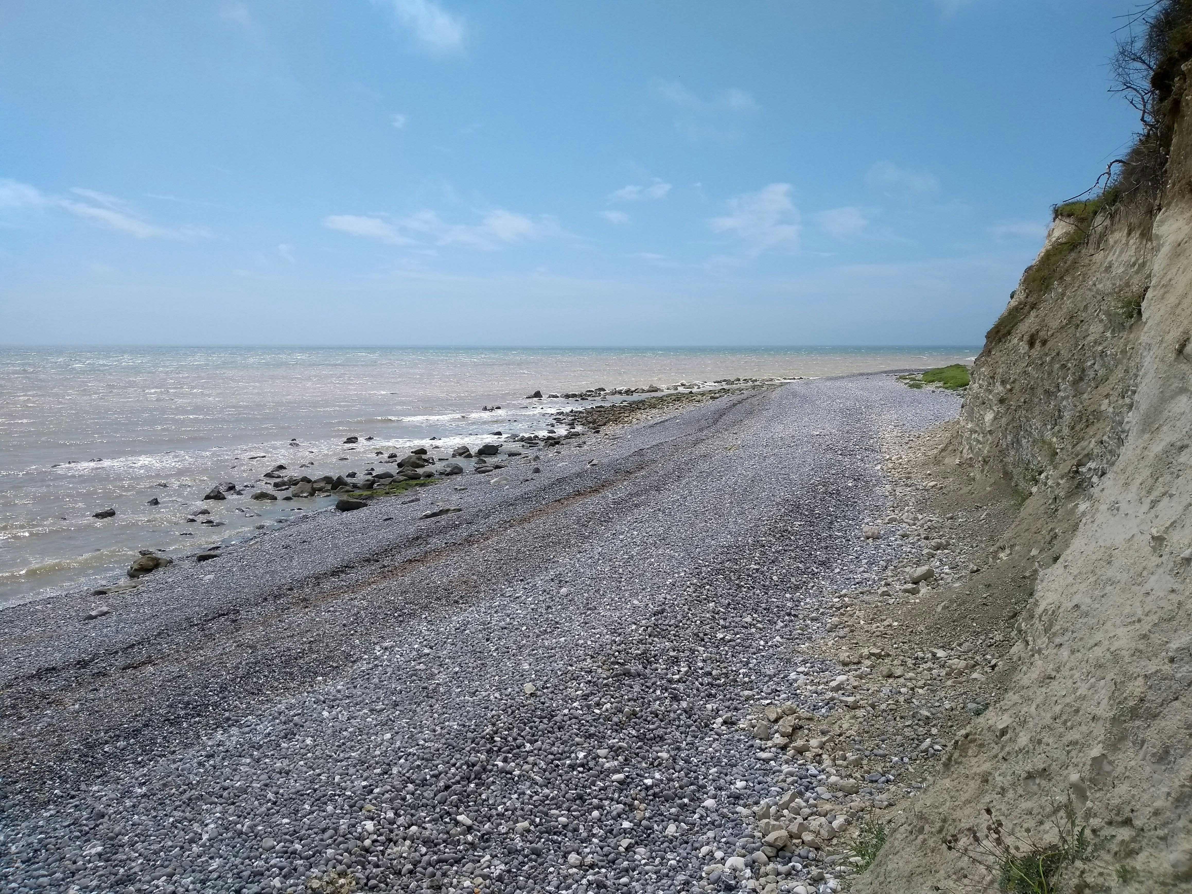 Pebble Coastline: A Quiet Path Toward a Sea-Blue Horizon